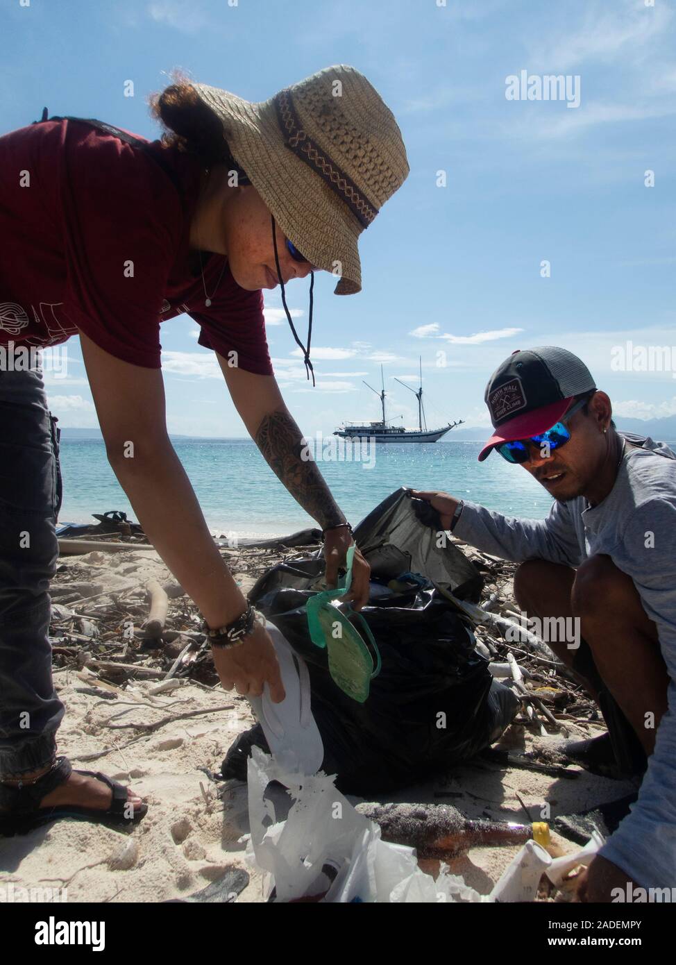 Collecting plastic waste. The crew of an eco-friendly cruise ship ...