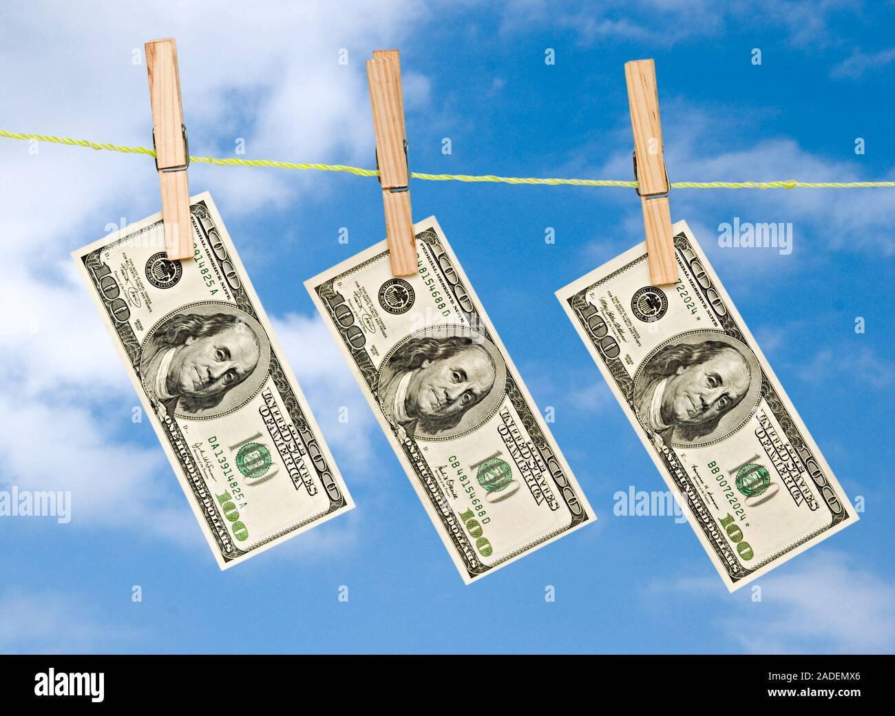 Dollar banknotes drying after laundry on rope Stock Photo - Alamy