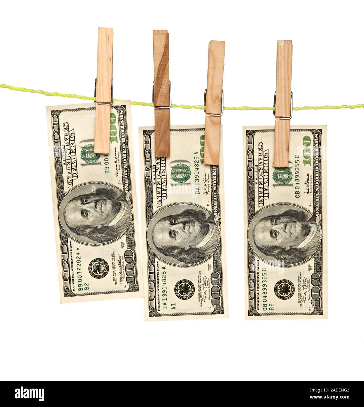 Dollar banknotes drying on rope after laundry Stock Photo - Alamy