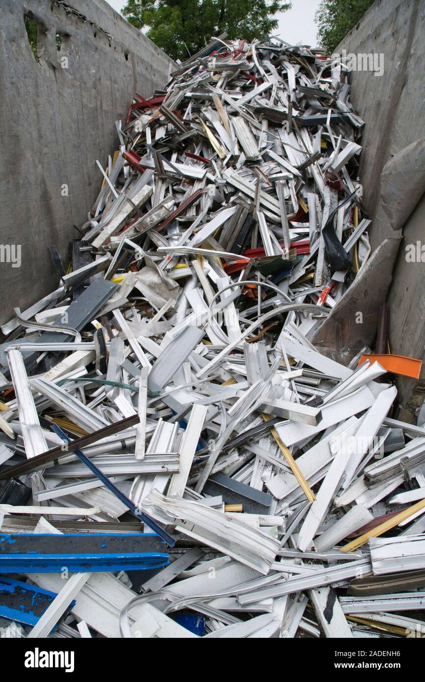 Skip full of aluminium extrusion from billets at a metal recycling ...