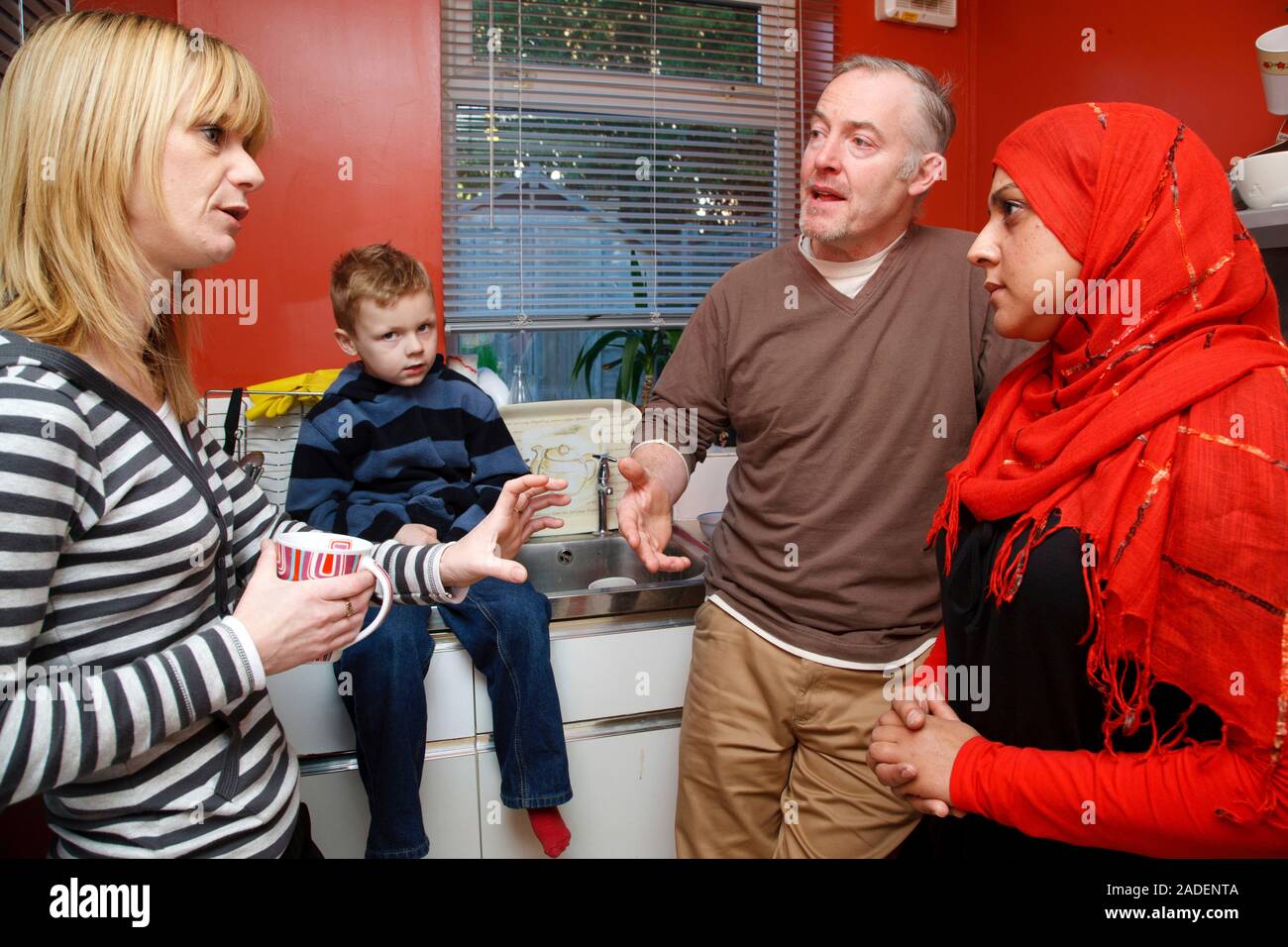 Professional visiting family at home Stock Photo - Alamy