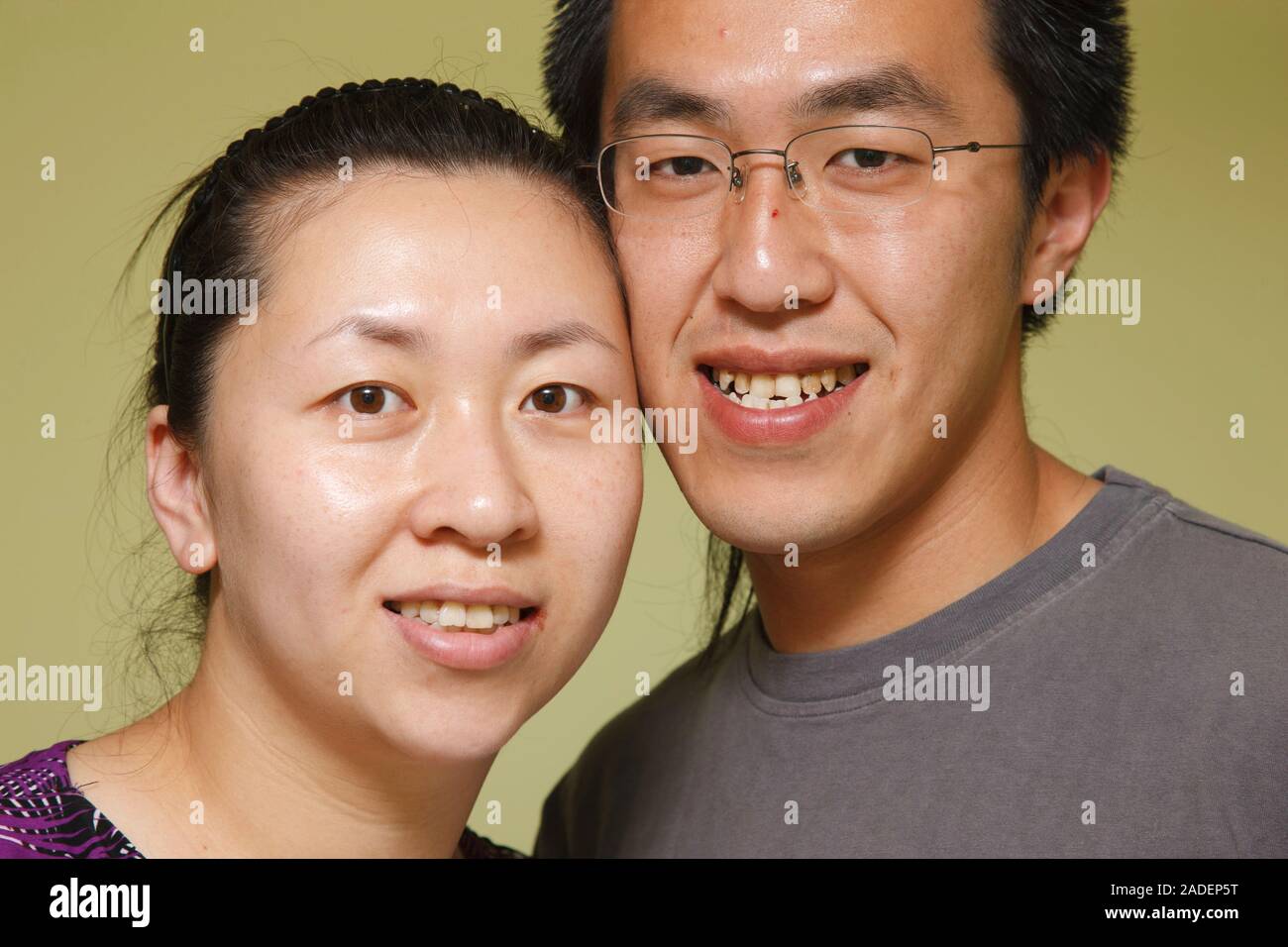 Portrait of young Chinese couple Stock Photo - Alamy