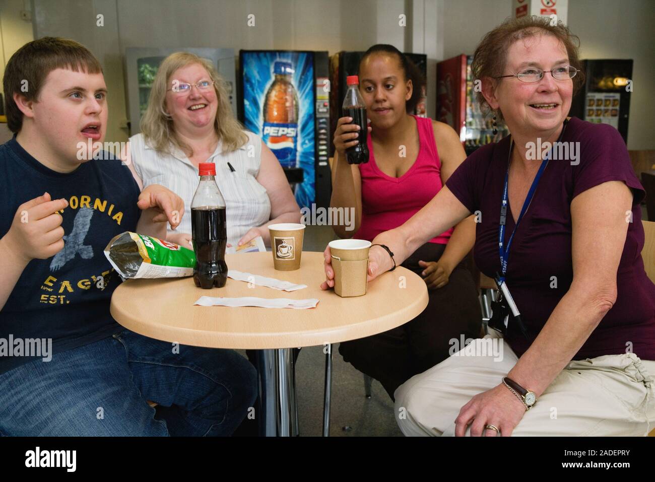 Students with learning disabilities and staff taking a break from ...