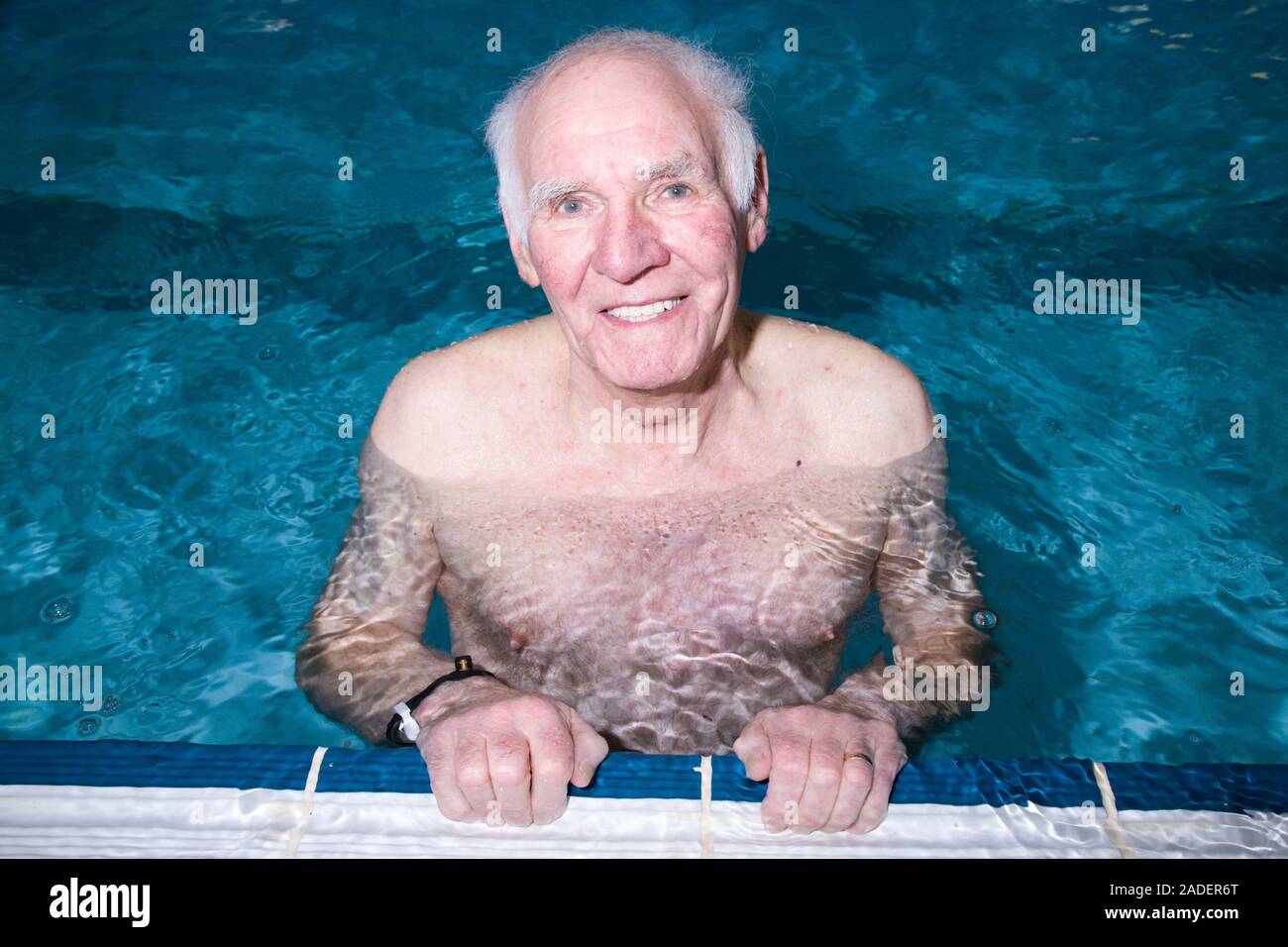 Older man in the swimming pool at his local leisure centre Stock Photo ...