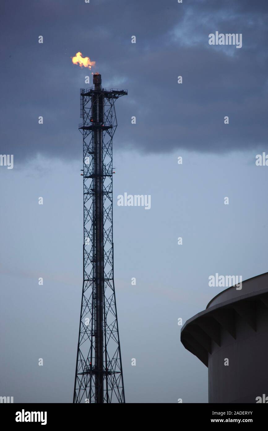 Flaring gas at oil refinery, Immingham, Lincolnshire, UK Stock Photo ...