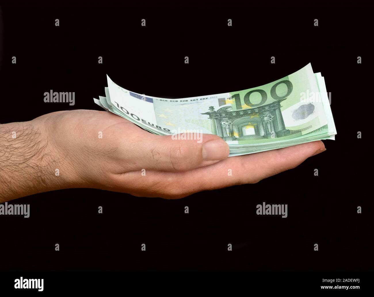 Hand with euro banknotes Stock Photo - Alamy