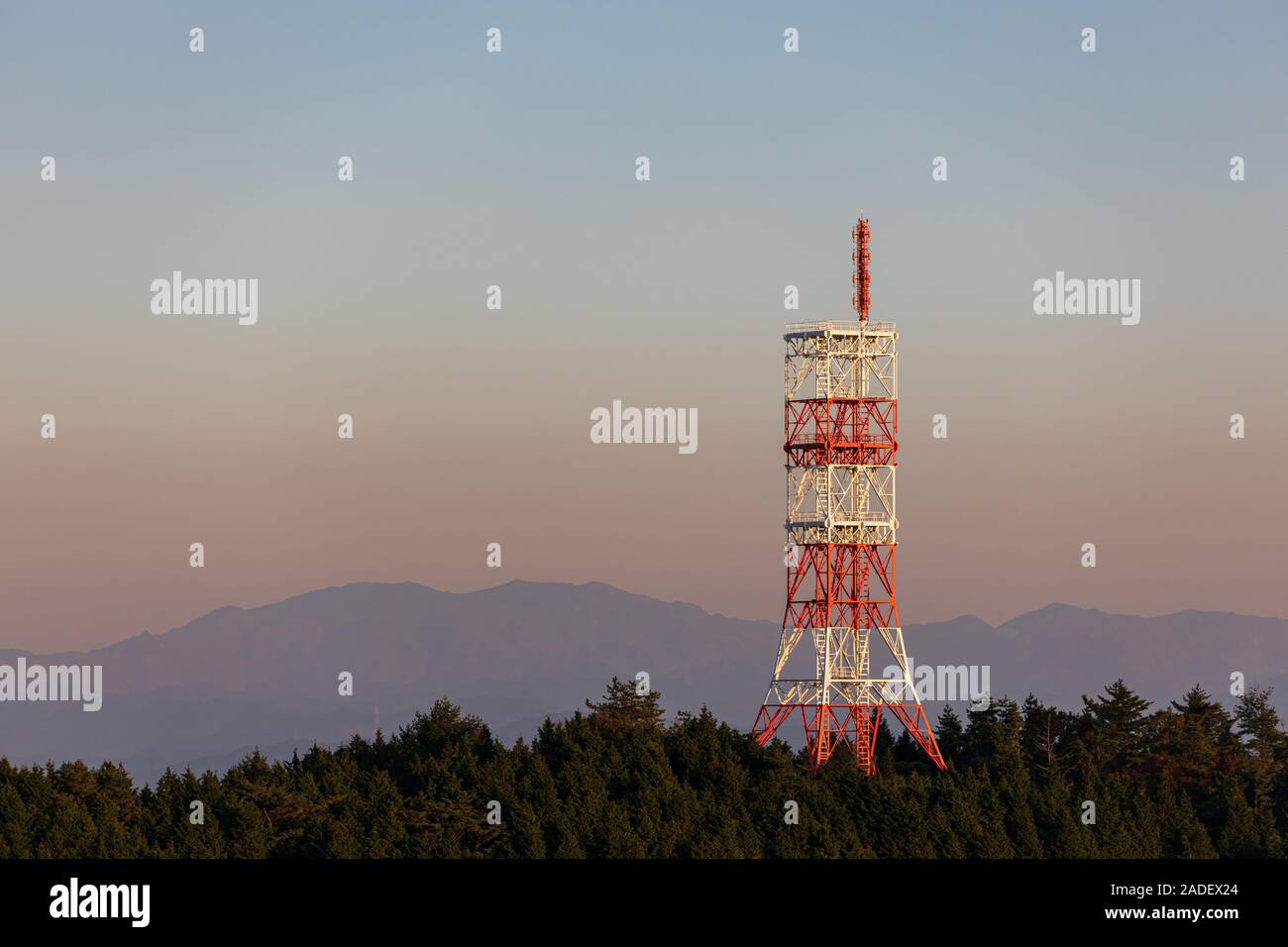 Radio tower on mountaintop at sunset Stock Photo - Alamy