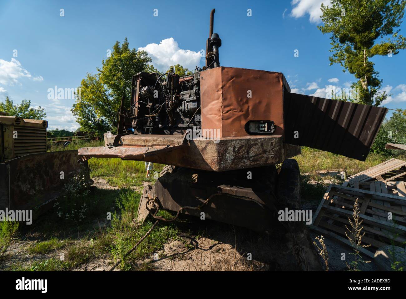 Old excavator in the field in sunny day Stock Photo - Alamy