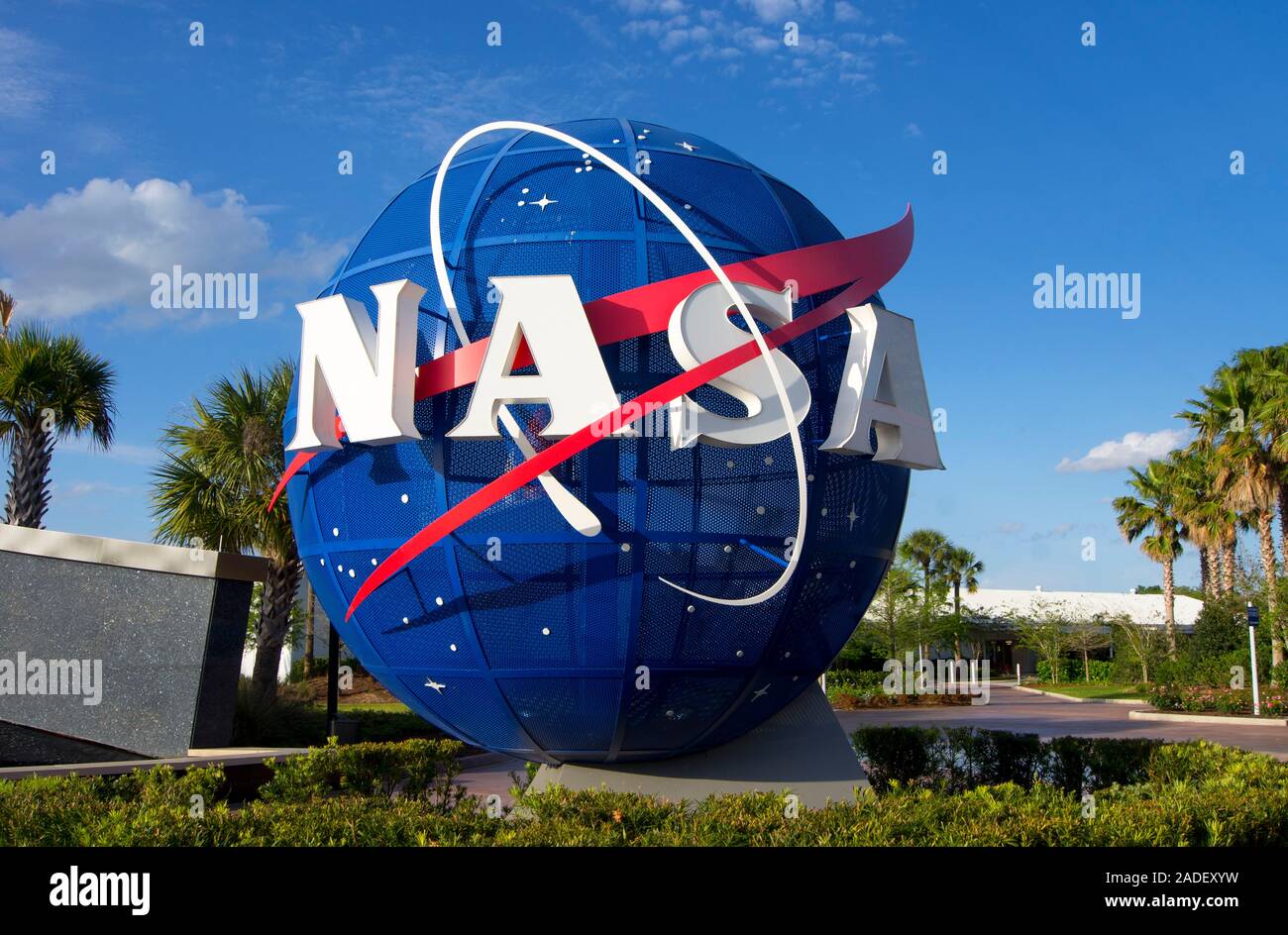 A globe-shaped sign at the entrance to the Kennedy Space Center Visitor ...