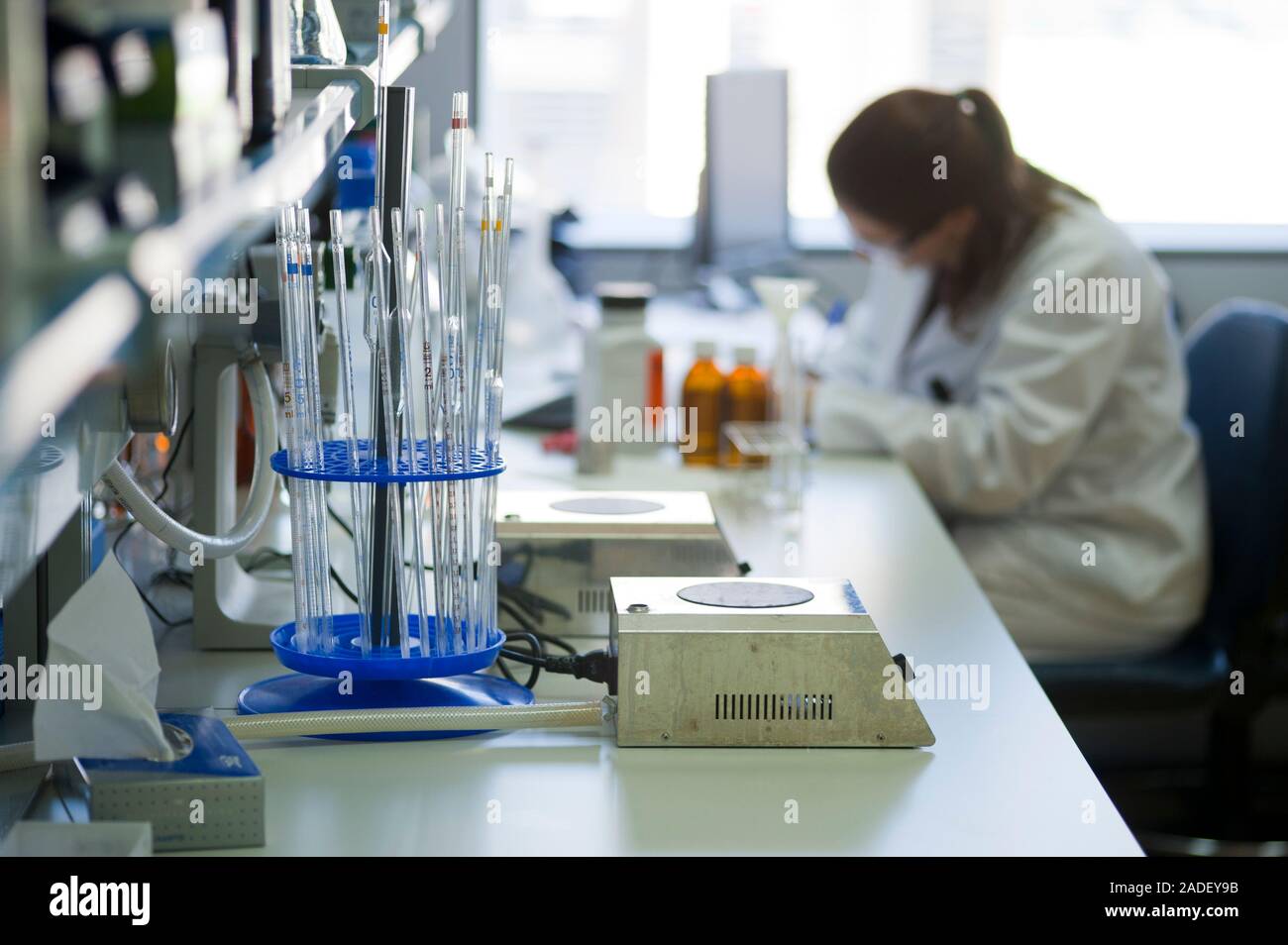 Pharmaceutical research. Researcher working in a laboratory ...