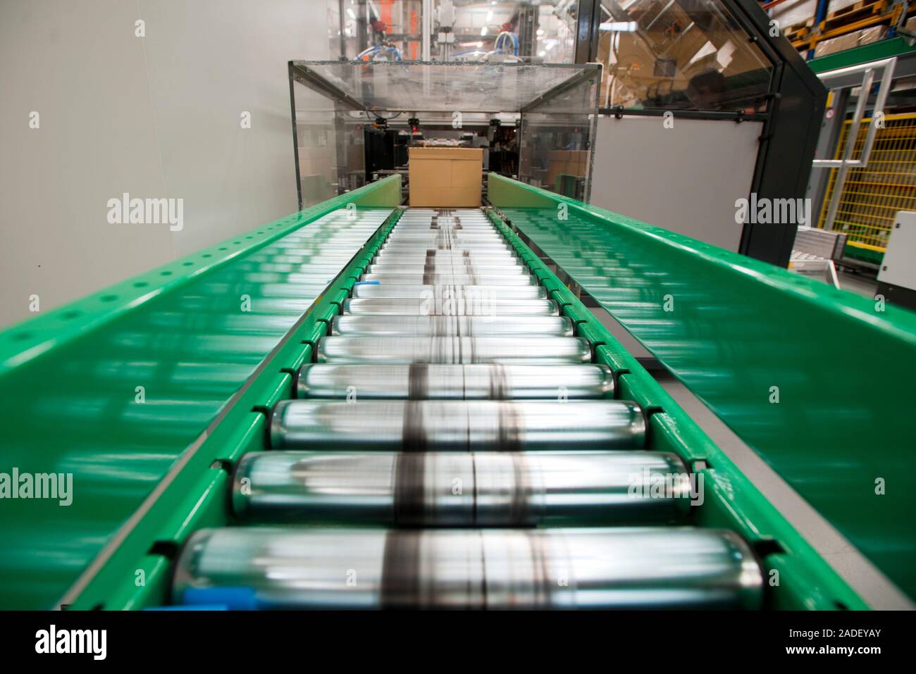 Pharmaceutical drug warehouse. Drugs being packaged and stored at a ...