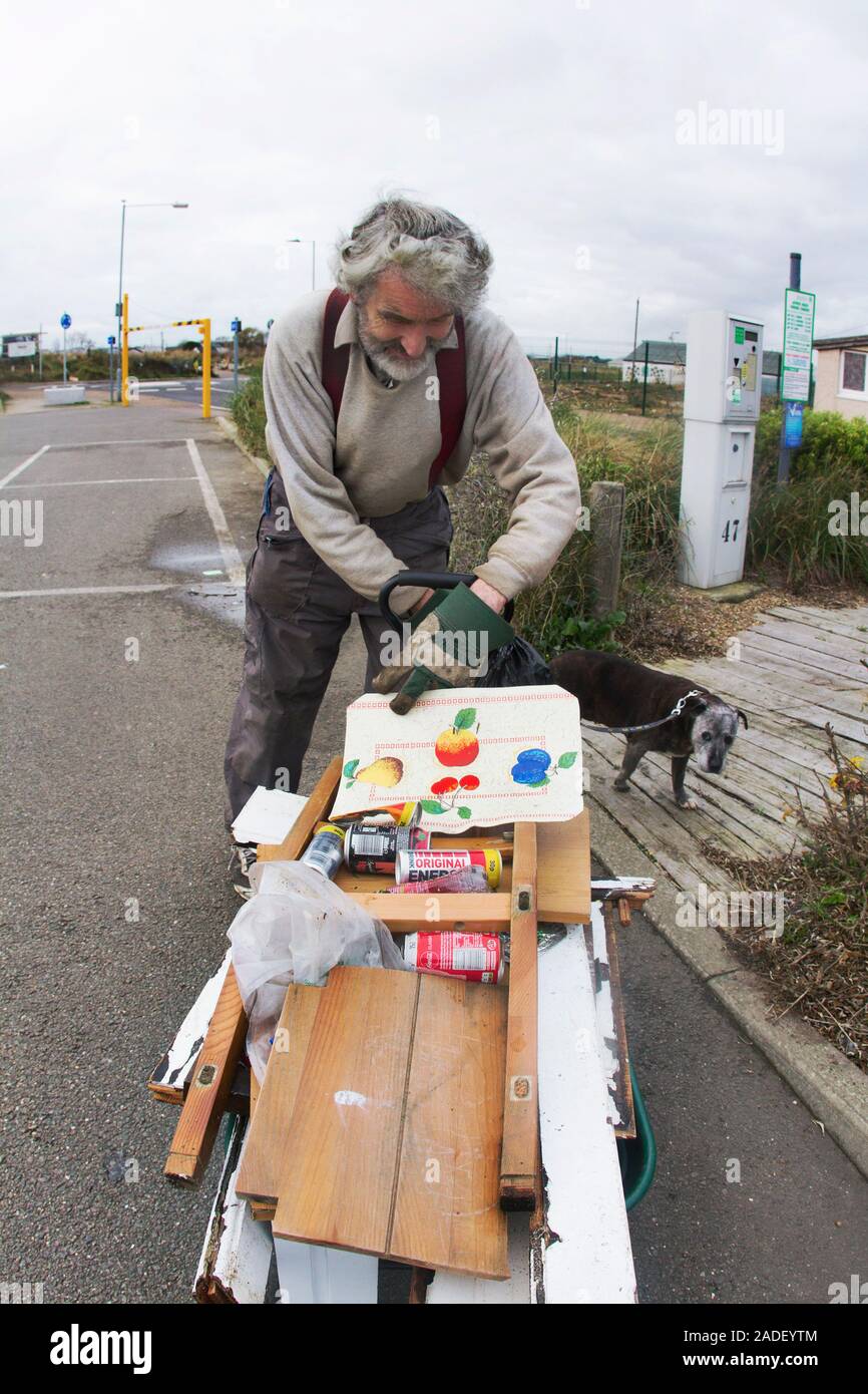 Litter champion collecting rubbish with a home-made cart. Kevin Whales ...