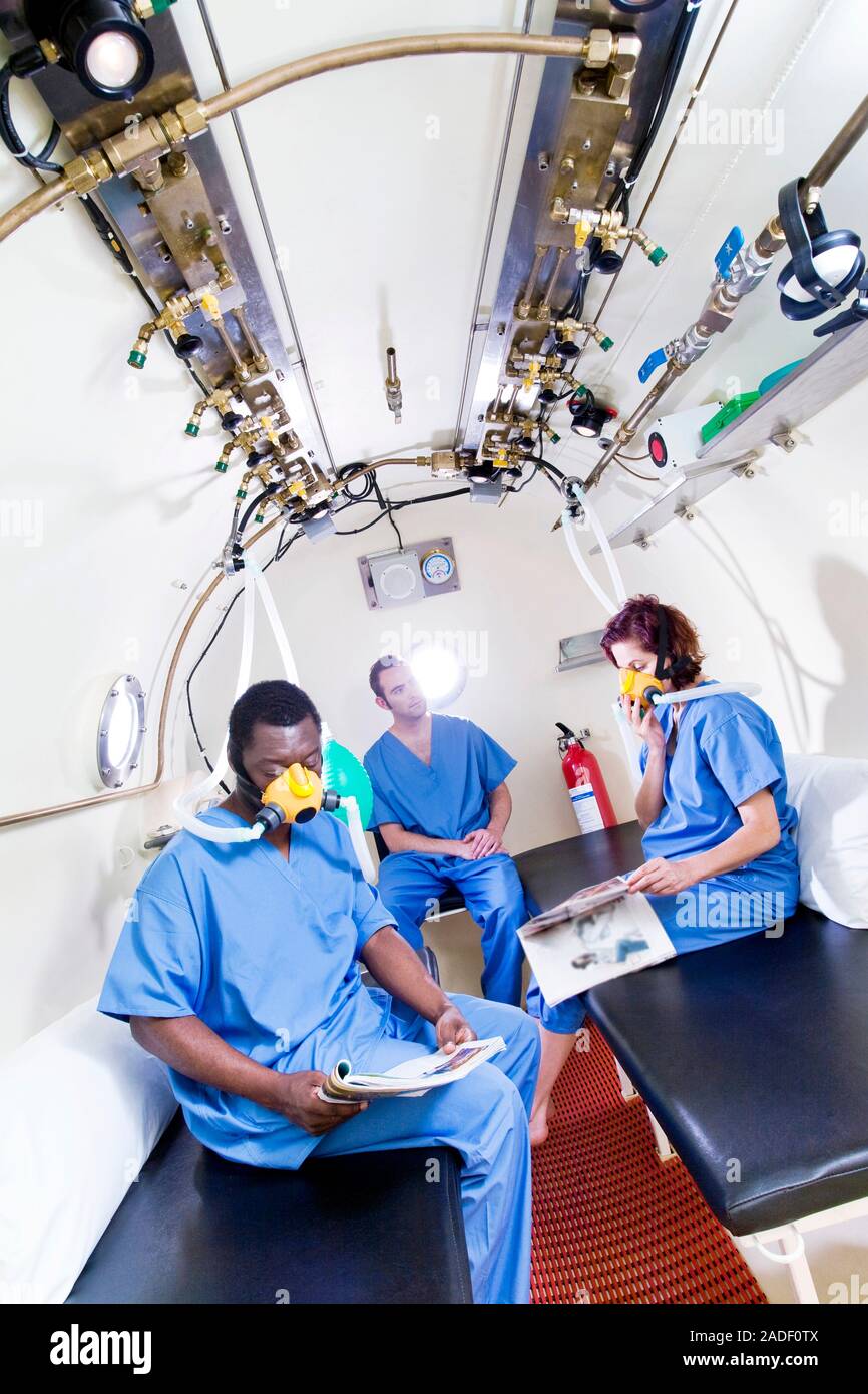 MODEL RELEASED. Hyperbaric oxygen therapy. Medical workers training in ...