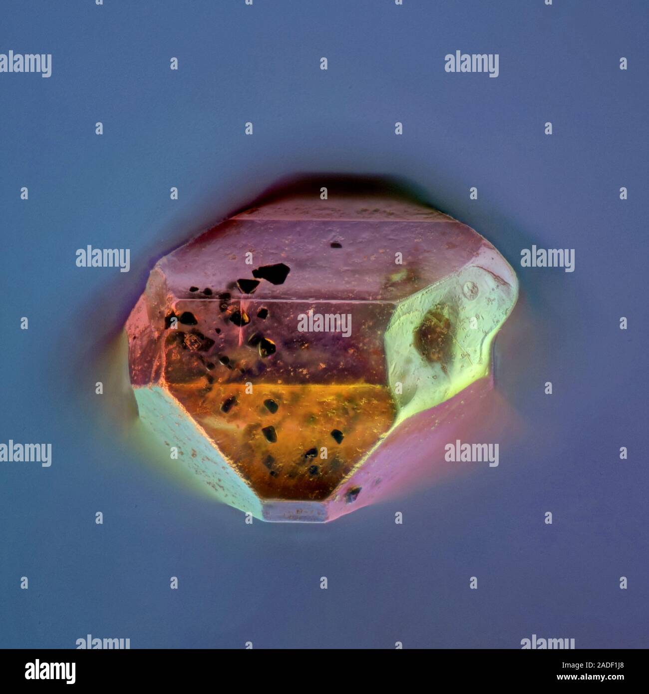 Sand grain. Polarised light micrograph of a section through a grain of ...
