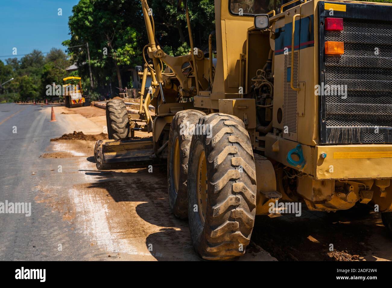 Grader is working on road construction. Grader industrial machine on ...