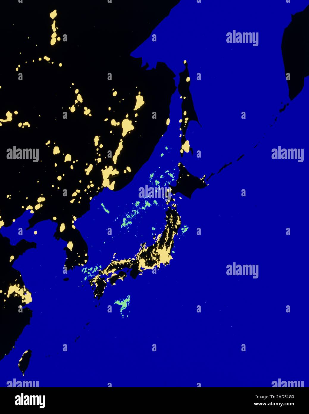 Japan at night from space. Colour-coded satellite image of Japan (at ...