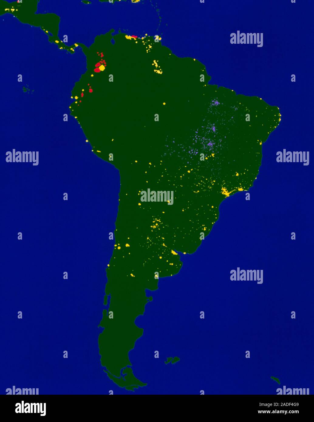 South America at night from space. Colour- coded image, based on ...