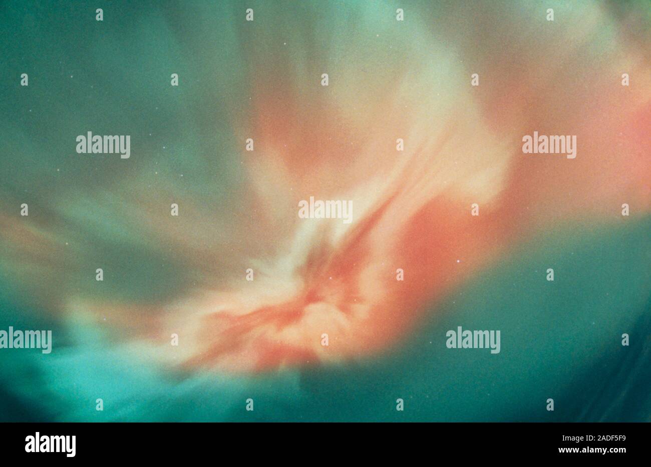 A spectacular aurora borealis display (northern lights) with red and ...