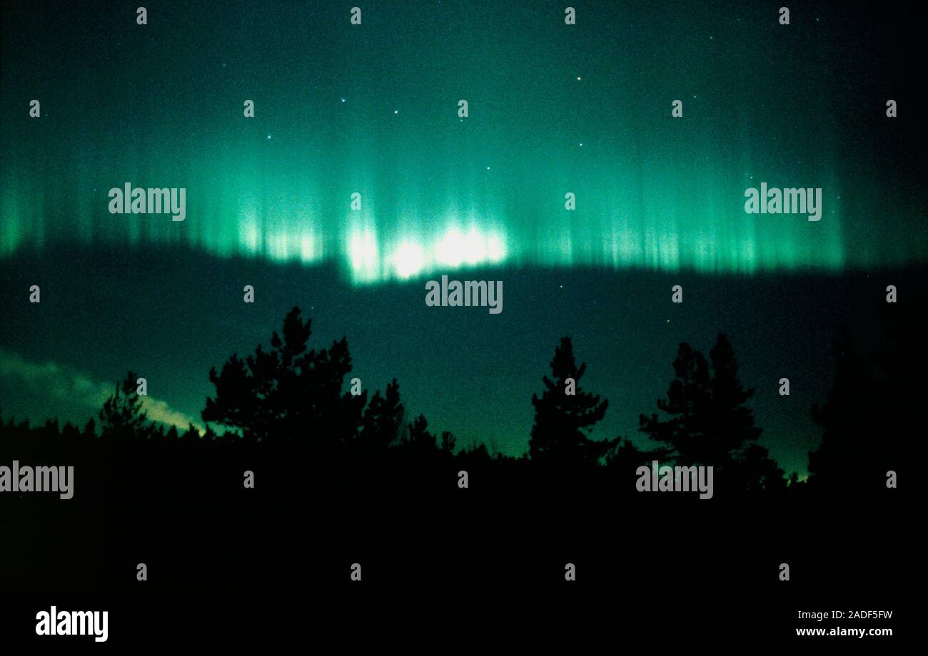 View of an aurora borealis display (green) centred on the constellation ...