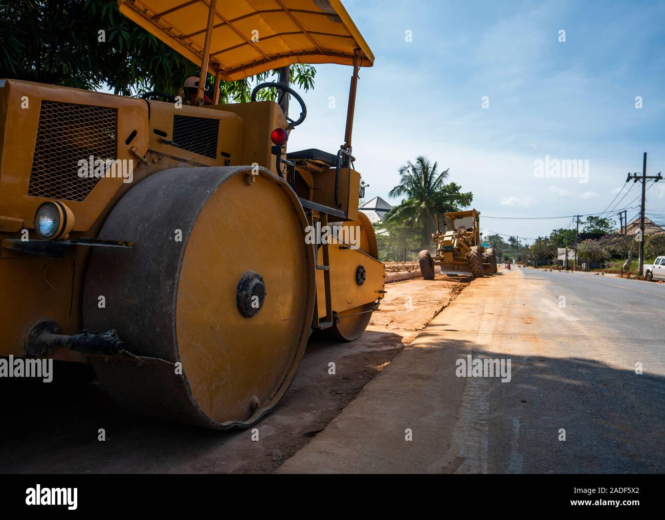 Road rollers working on the new roads construction site. Heavy duty ...