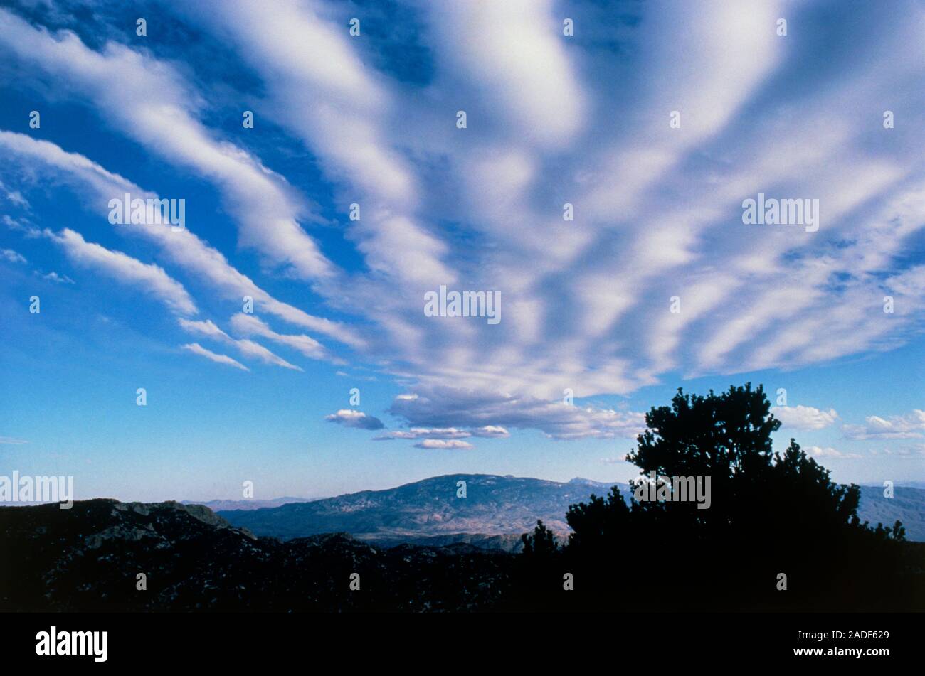 Stratocumulus clouds. Long streaks of strato- cumulus over distant ...
