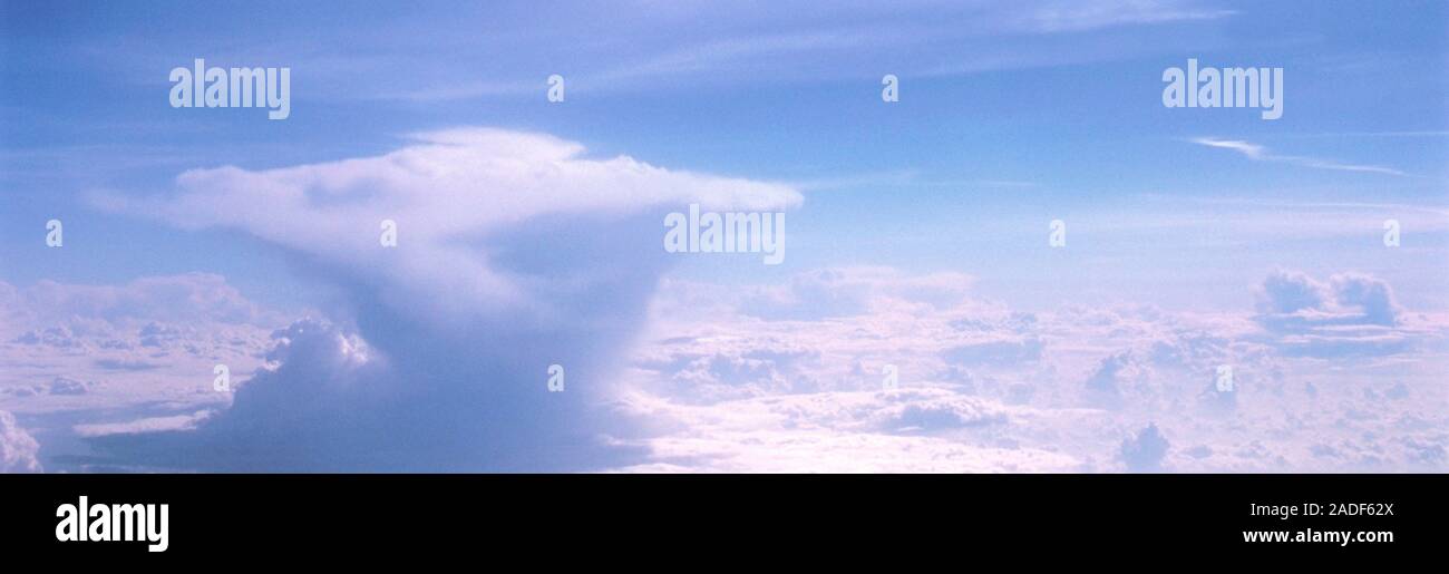Cumulonimbus cloud. Aerial view of the anvil- shaped top, or ...