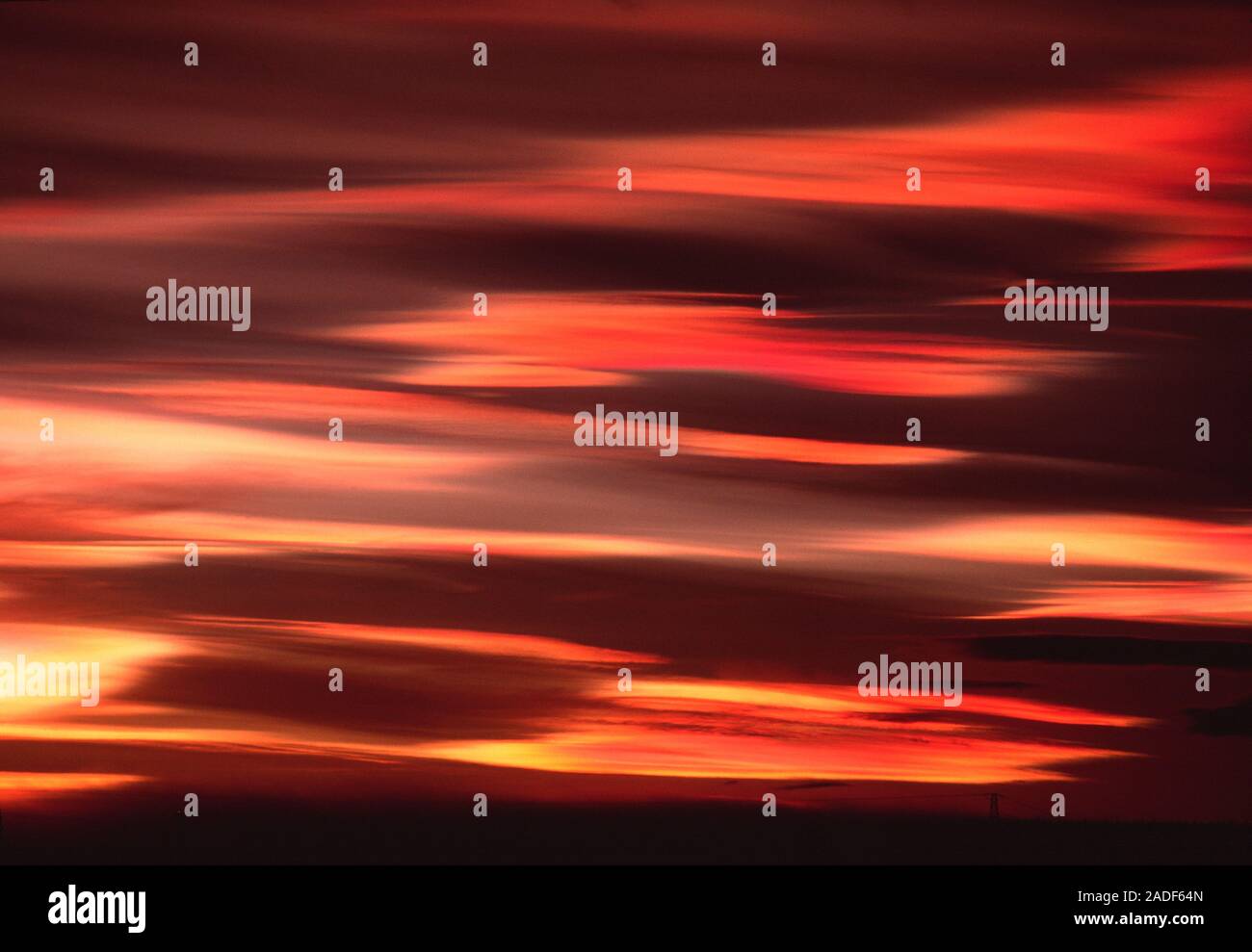 Polar stratospheric clouds at sunset. These are the nacreous or mother ...