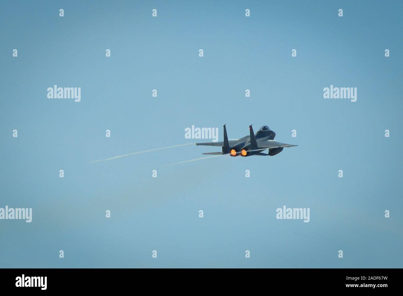 Military aircraft (fighter jet) flying for display in sunny day Stock ...