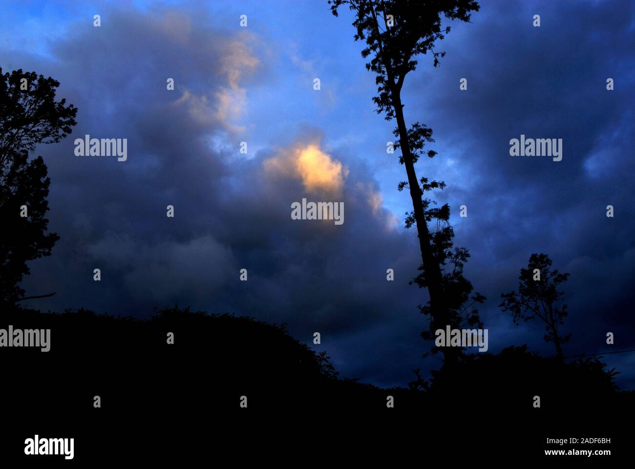 Monsoon storm clouds. Sunlight falling on monsoon rainclouds Stock ...