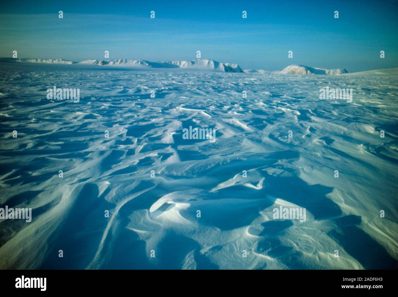 Sculpted snow patterns, known as sastrugi, seen in Spitsbergen, the ...