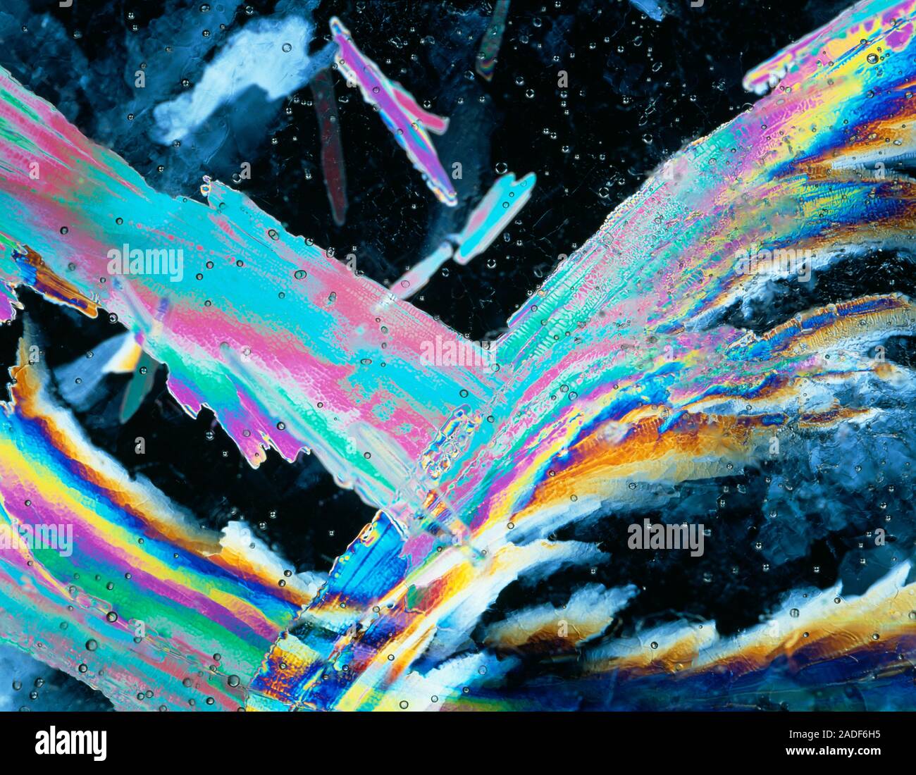 Ice crystals. Polarised light micrograph of a thin sheet of ice. The ...