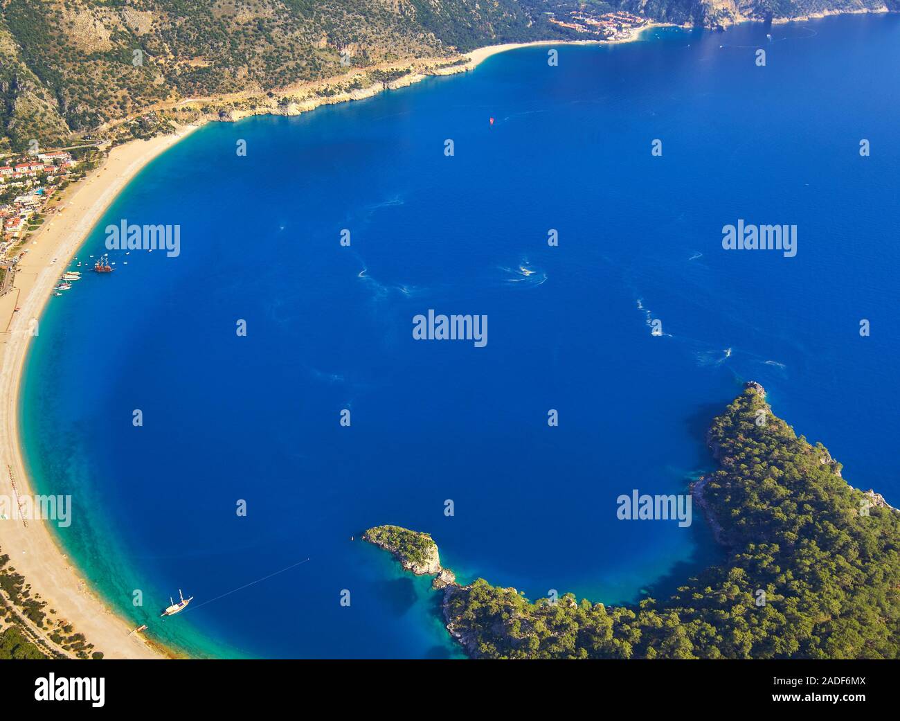 Aerial view of blue lagoon and pebble beach in Oludeniz, Fethiye ...