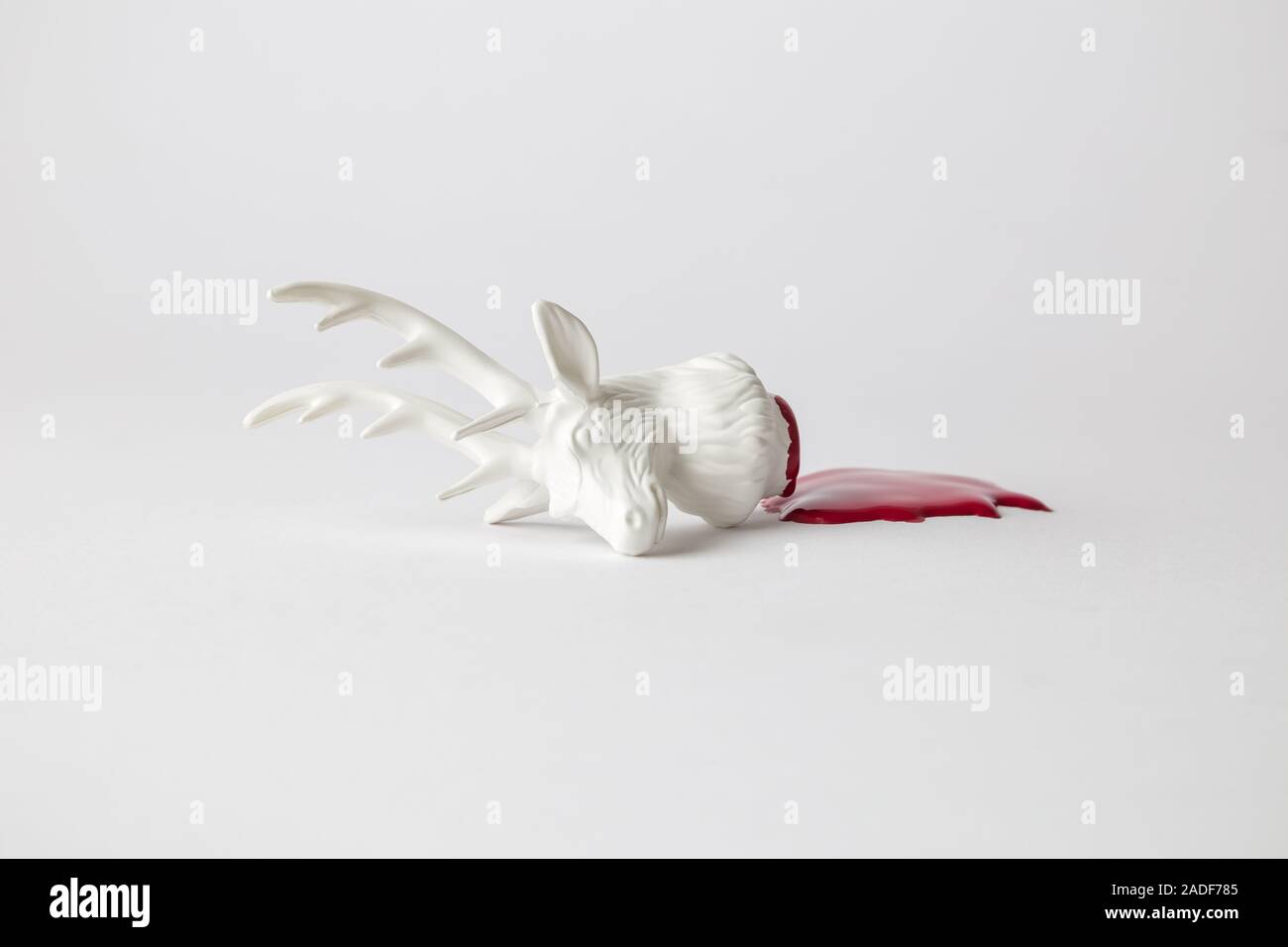 Reindeer in pool of blood abstract. Stop hunting and save the animals ...