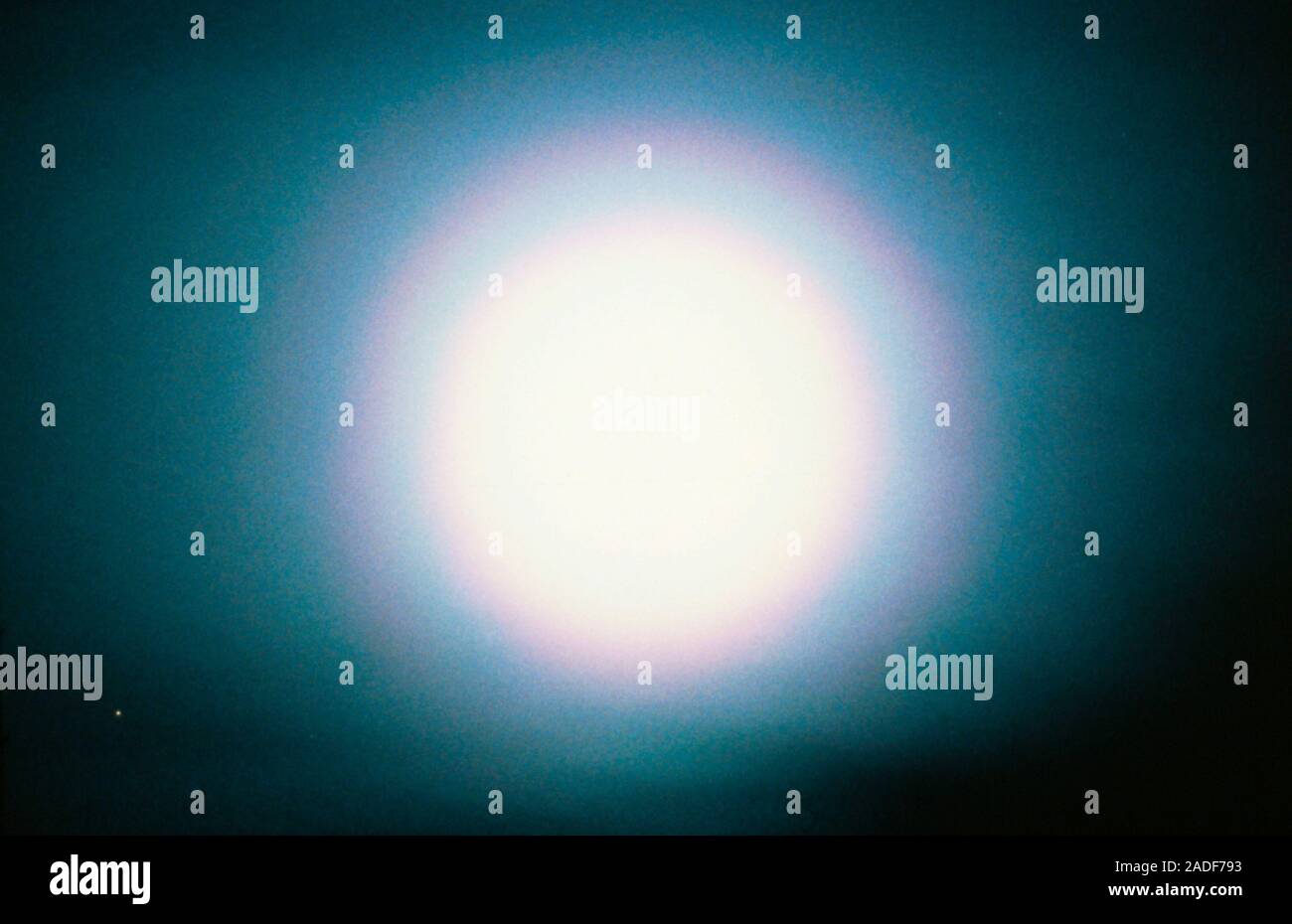 Image of the optical atmospheric effect known as a corona around the ...