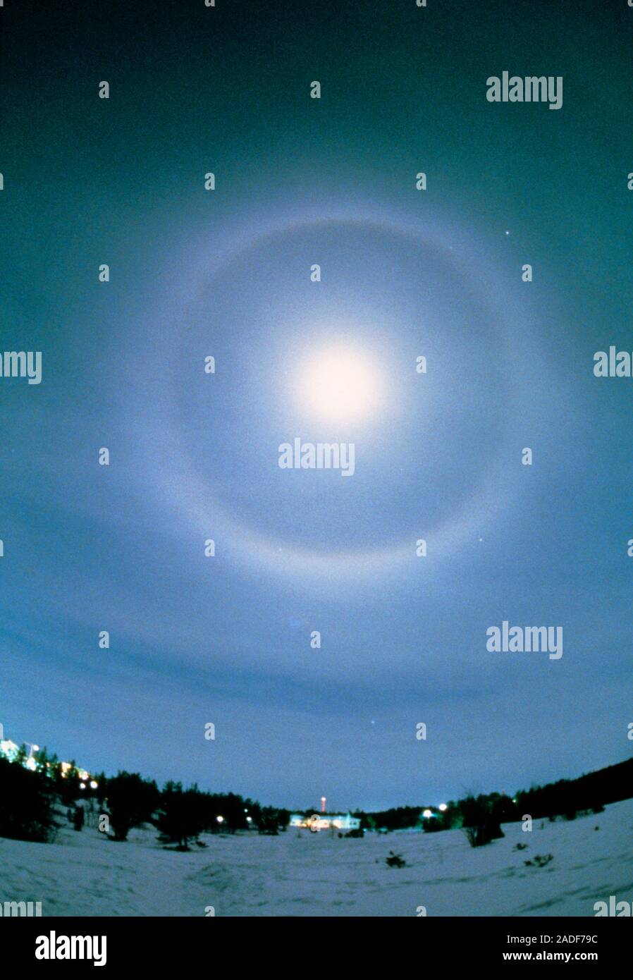 Halo around the Moon. This is the common 22-degree halo, so called as ...
