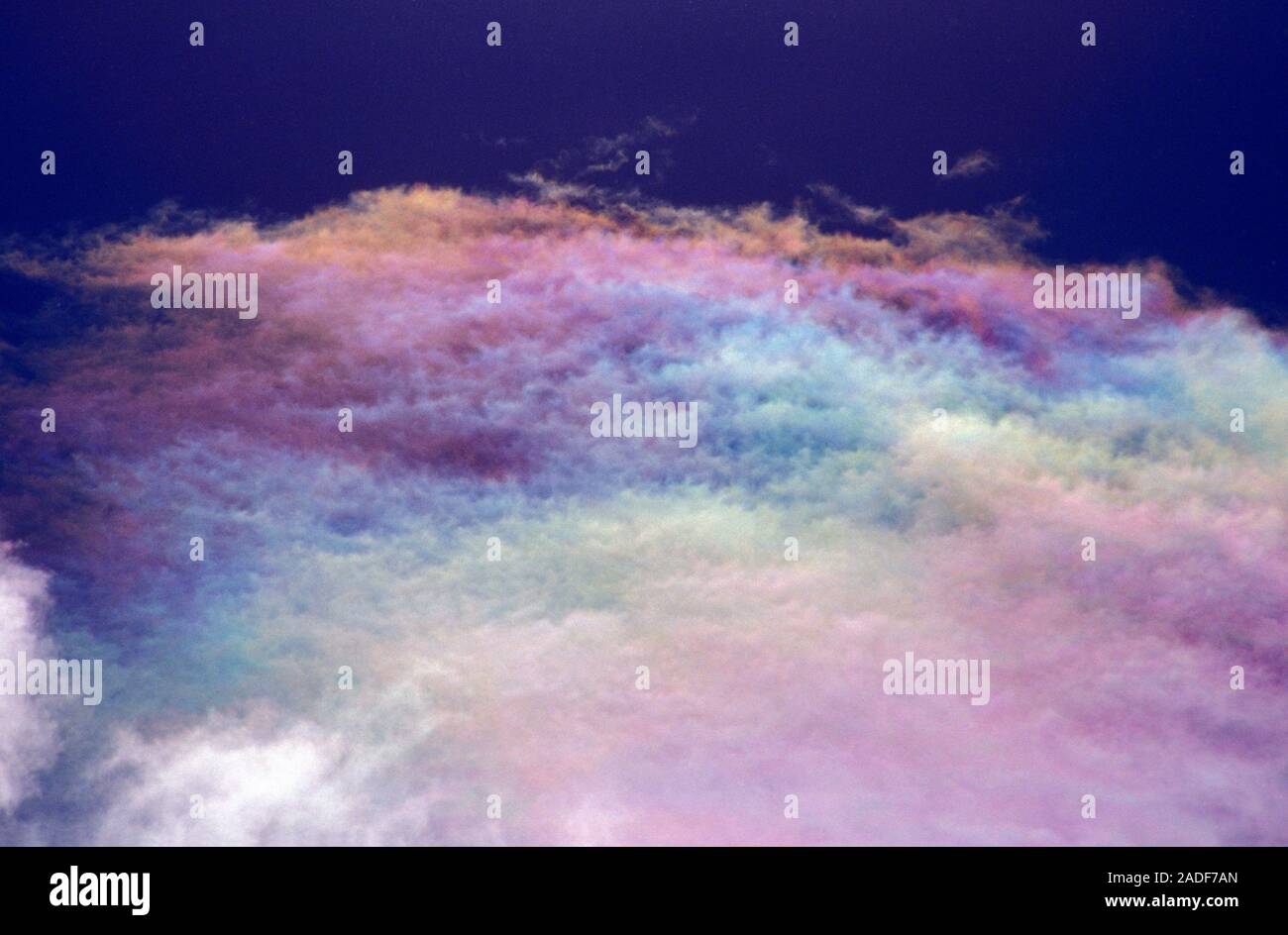 Iridescent clouds formed by diffraction of sunlight by water droplets ...