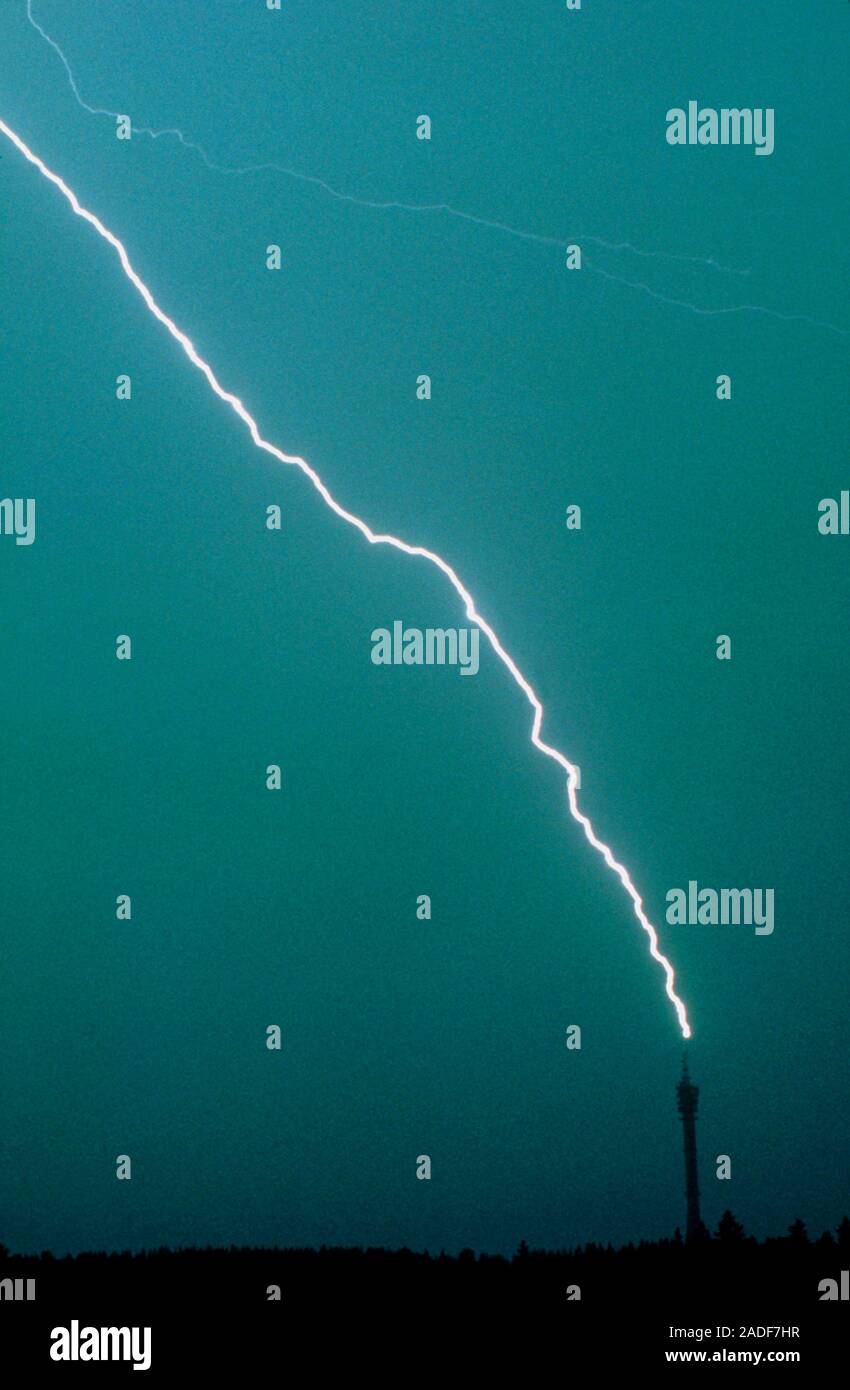 Lightning. A lightning bolt striking a telecommunications tower ...