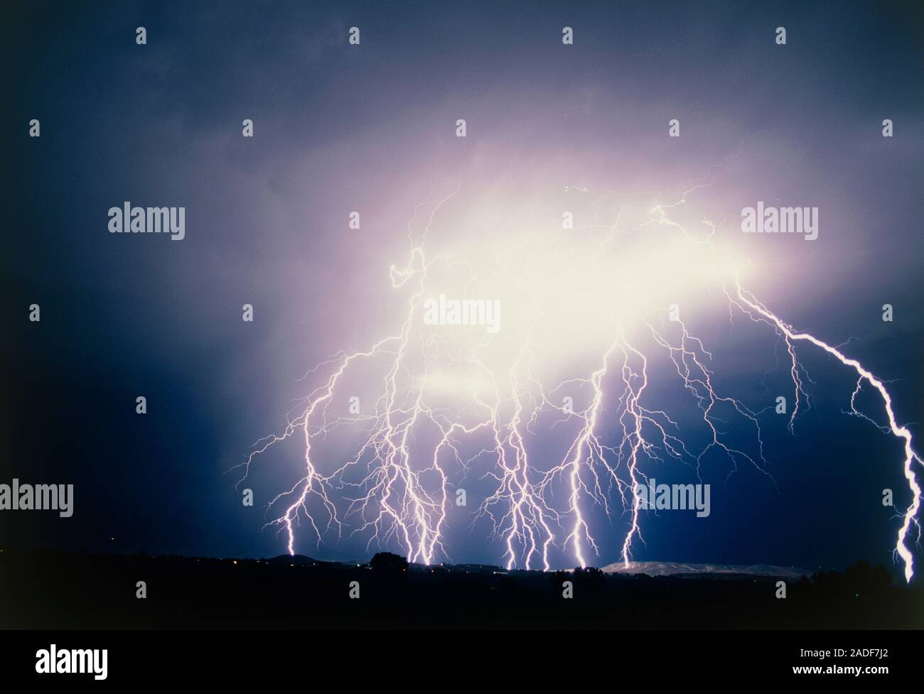 Lightning. Multiple bolts of lightning striking the ground. Lightning ...