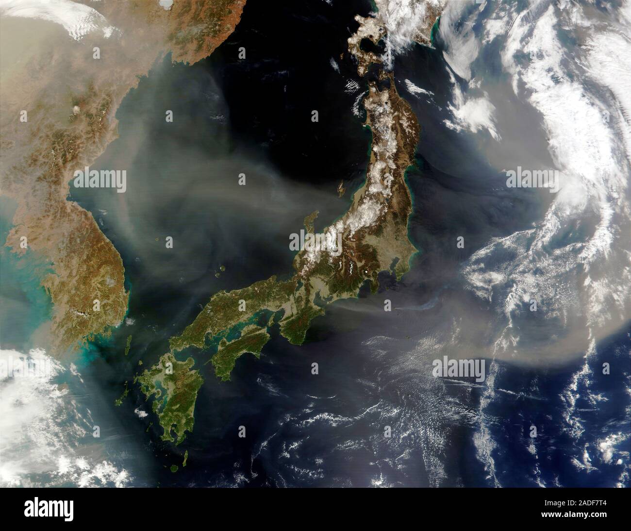 Dust cloud over Sea of Japan. North is at top. Satellite image of a ...