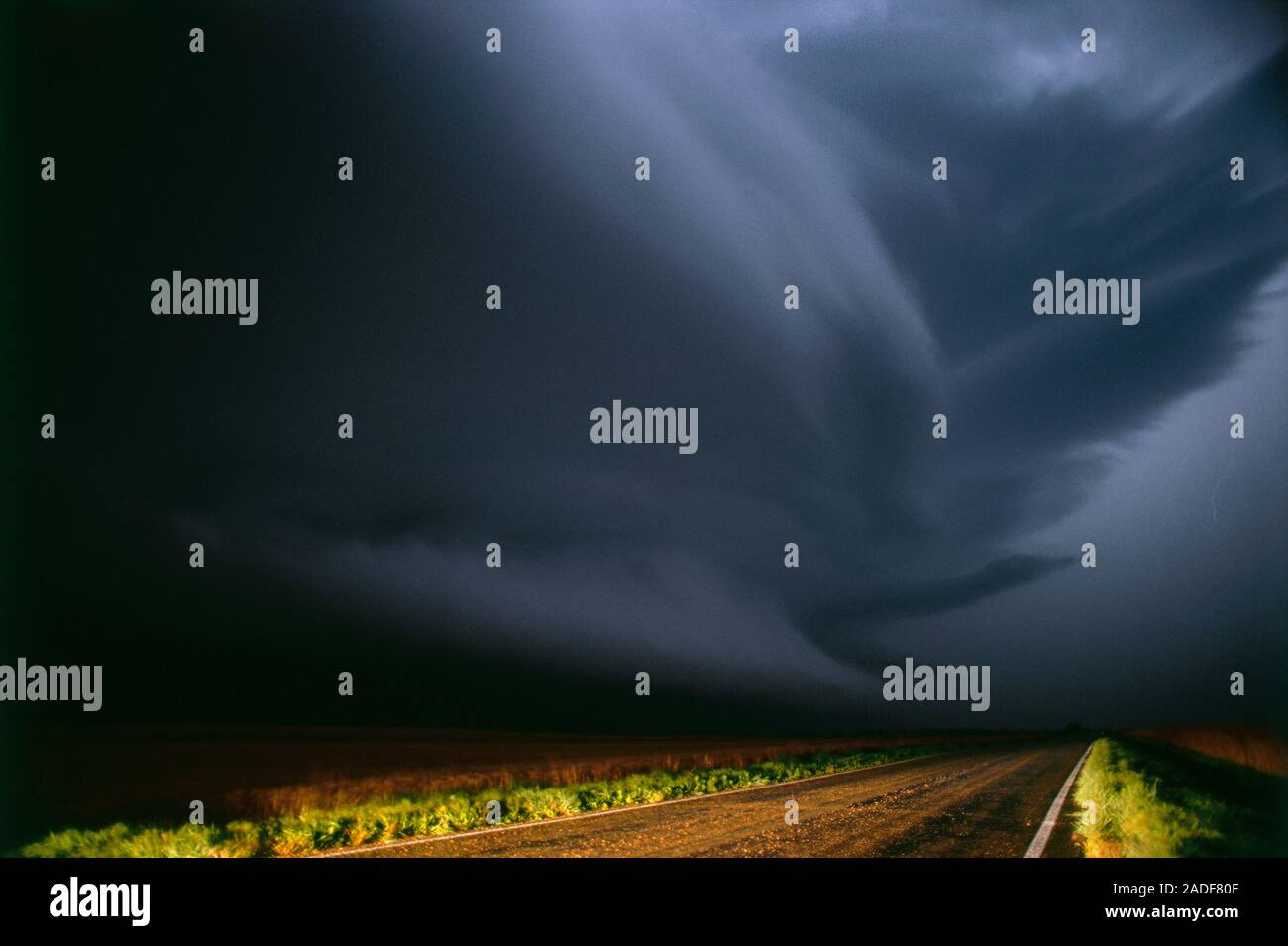Mesocyclone thunderstorm illuminated by moonlight. Tornados can develop ...