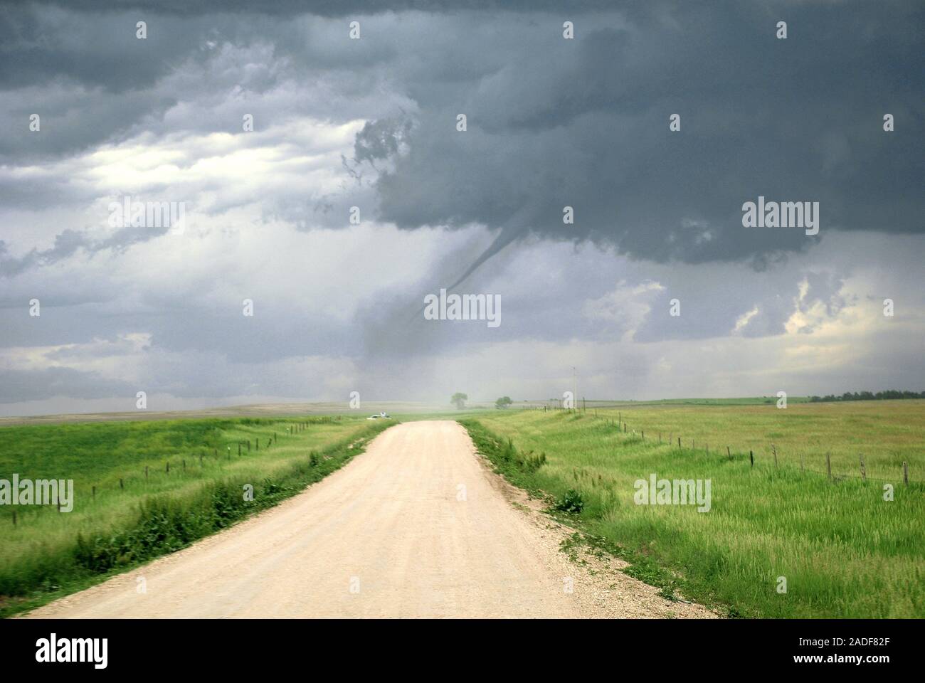 Tornado. A tornado is a violent rotating column of air that forms ...