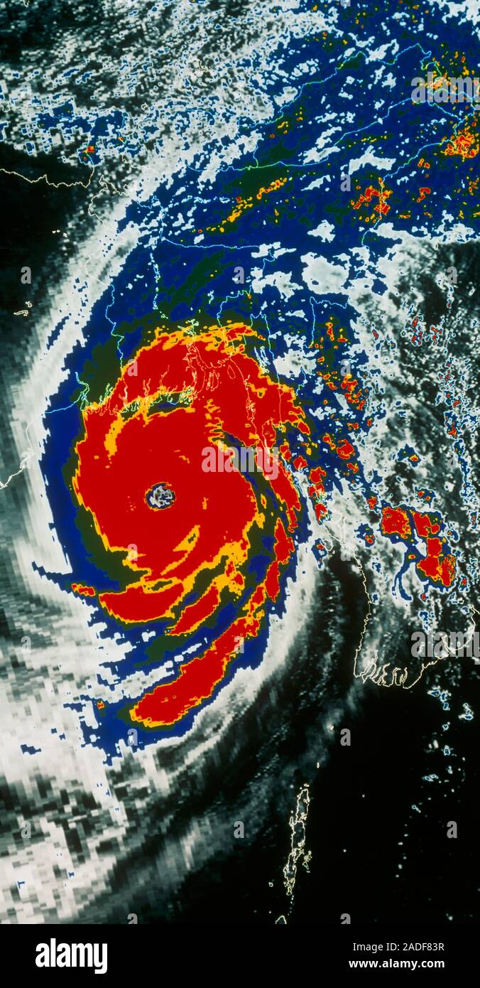 Typhoon. Colour-enhanced infrared NOAA satellite image of a typhoon ...