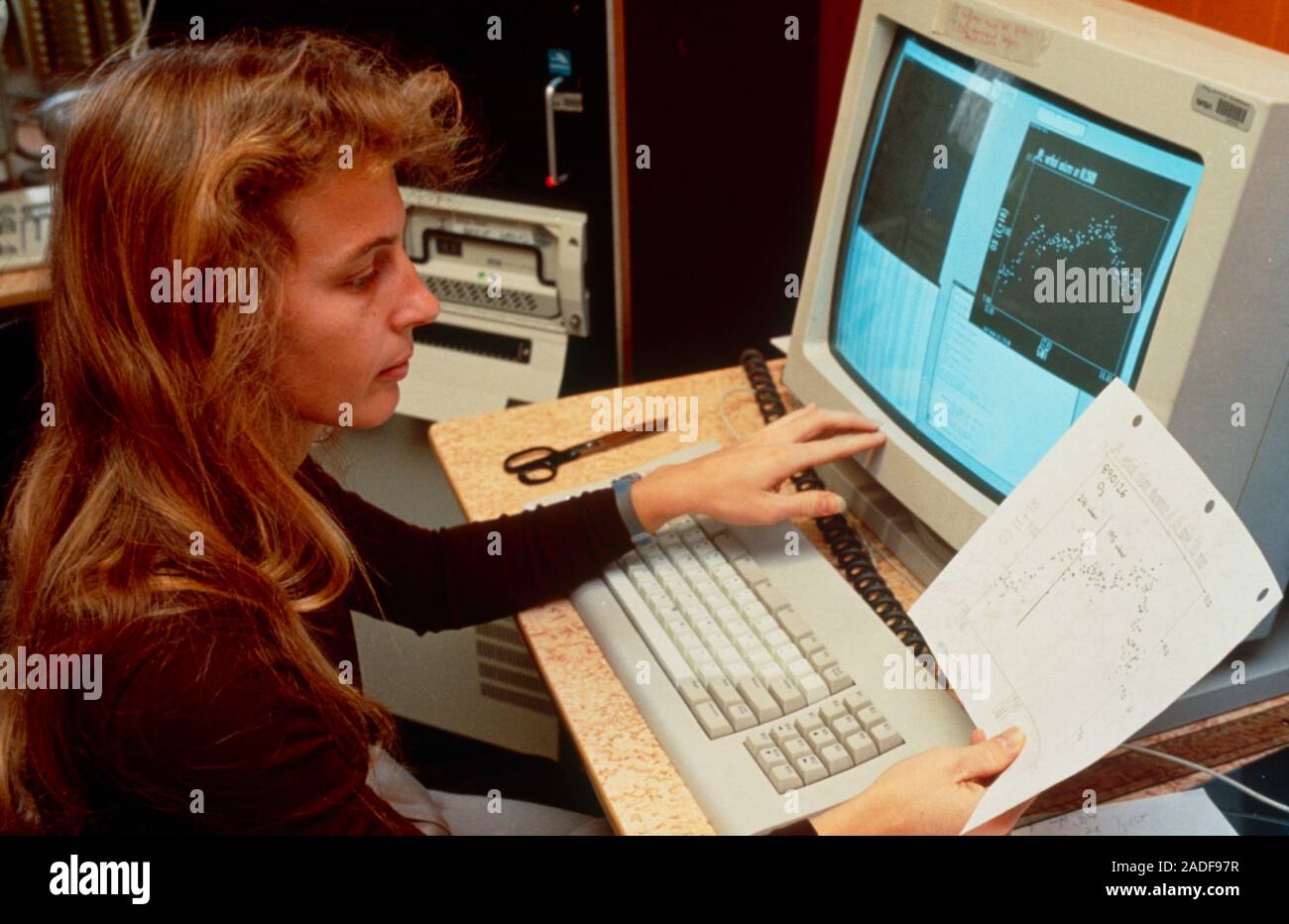 Arctic ozone hole research. NASA scientist doing computer analysis of ...