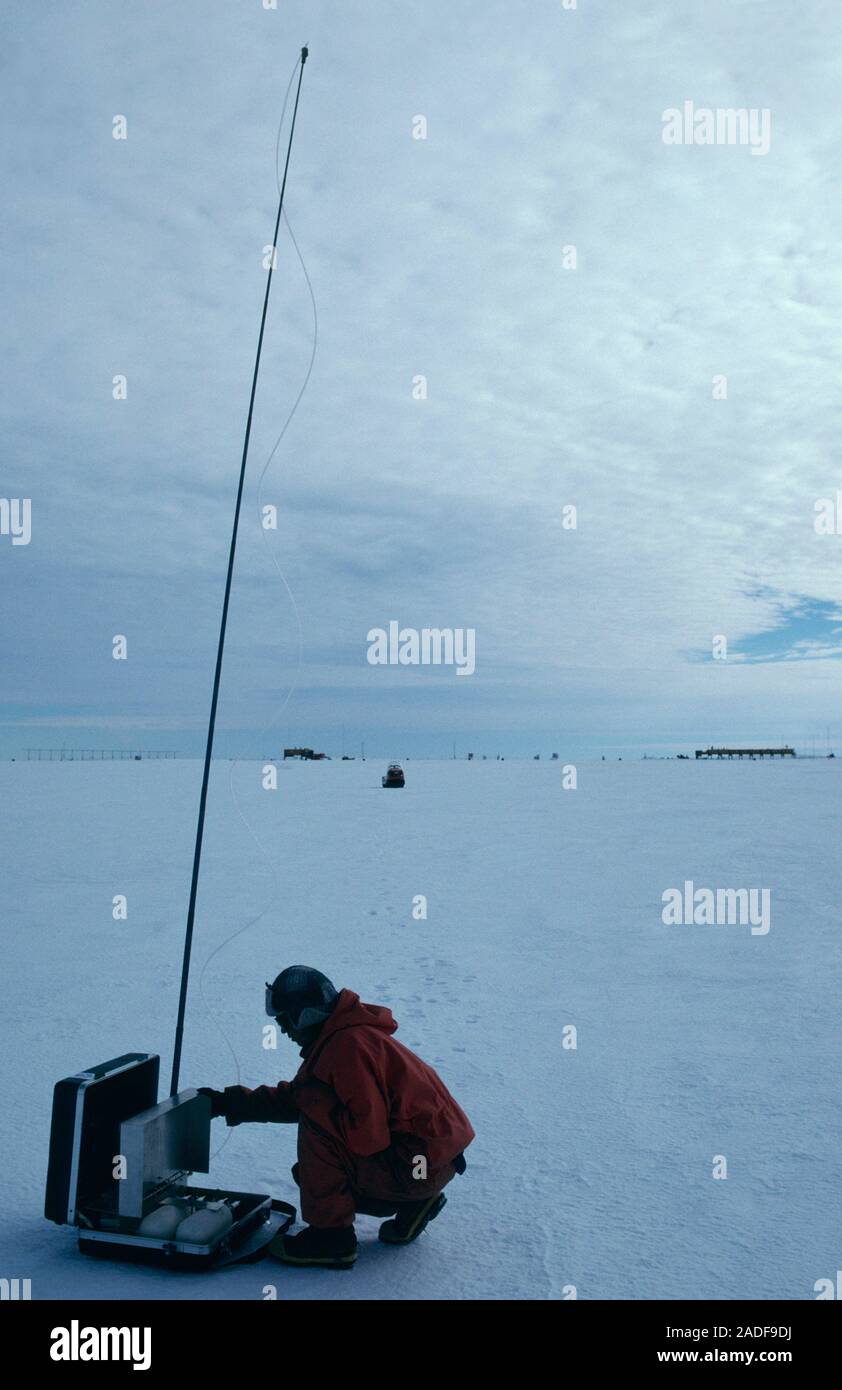 Air sampling. Atmospheric researcher using a portable sampling kit to ...