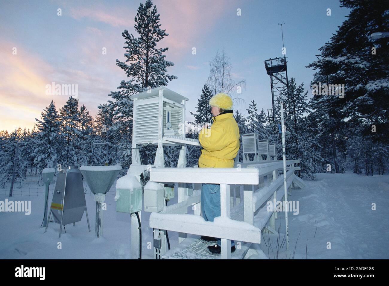 MODEL RELEASED. Meteorological measuring station. Meteorologist taking ...