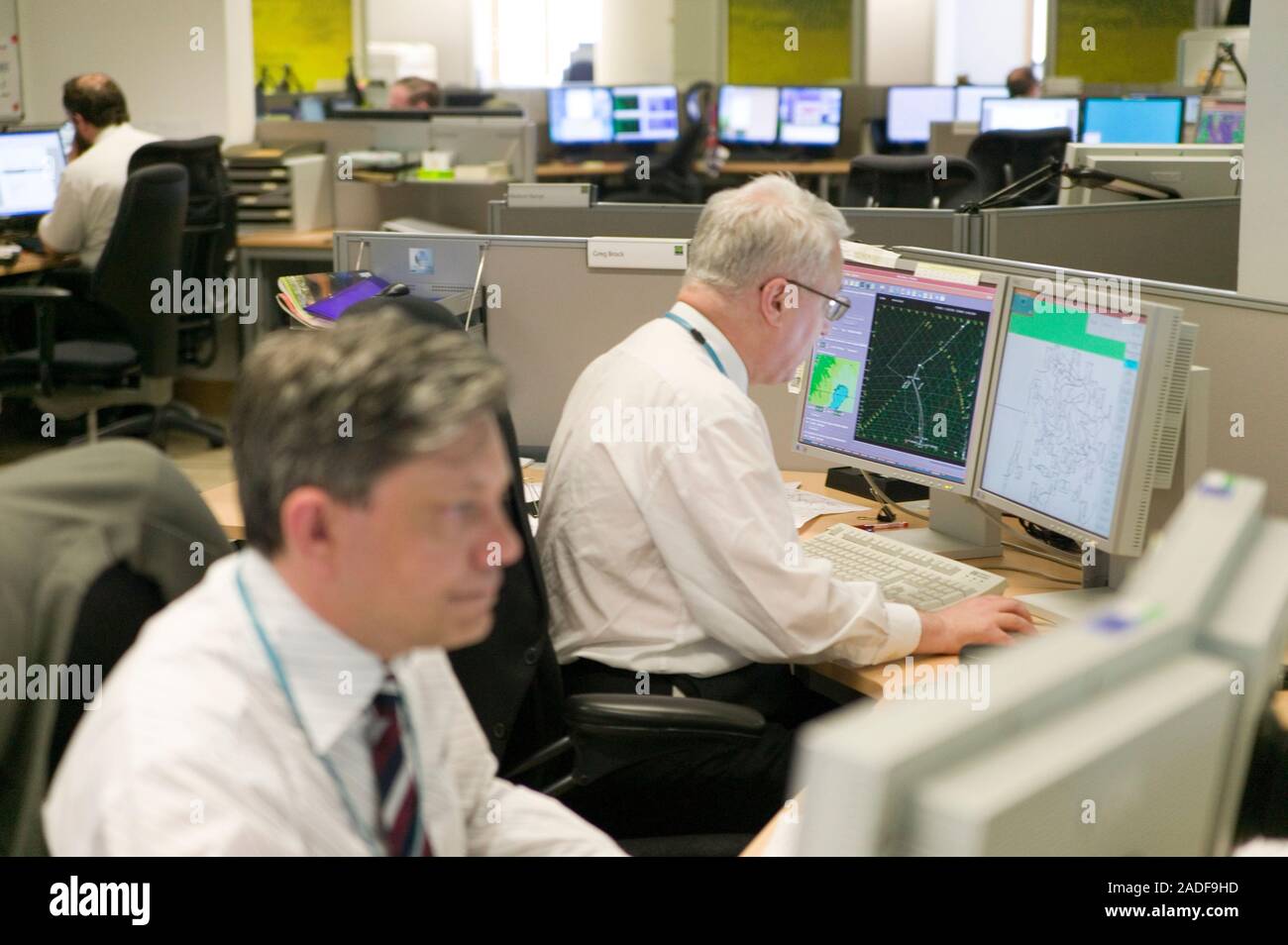 MODEL RELEASED. Weather forecasting. Meteorologists forecasting the ...