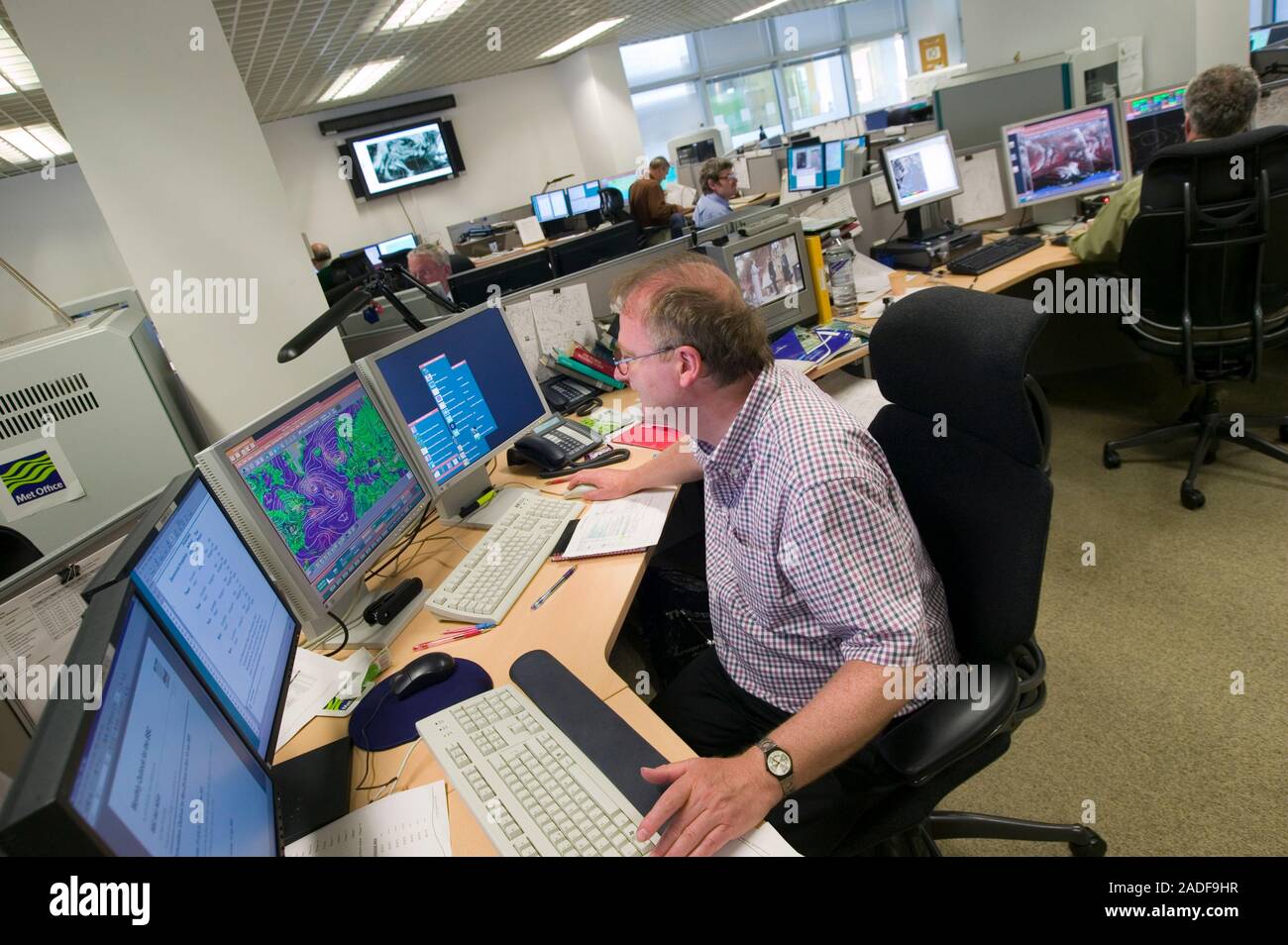 MODEL RELEASED. Weather forecasting. Meteorologist forecasting the ...