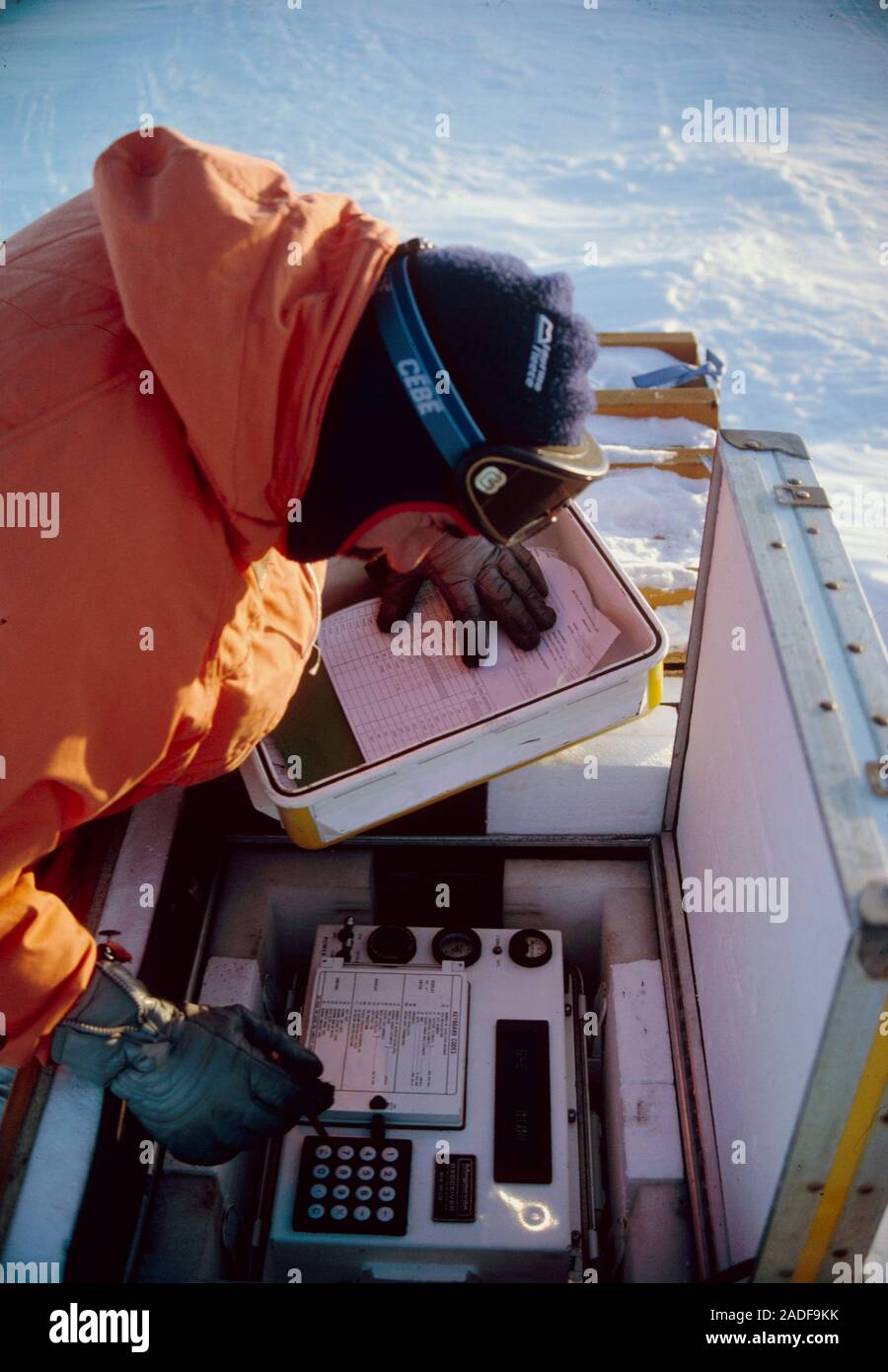 A surveyor uses a satellite receiver to establish a fixed position as a ...