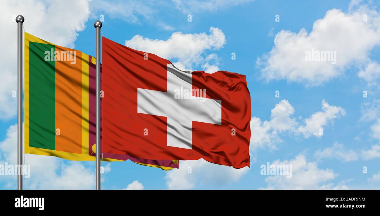 Sri Lanka and Switzerland flag waving in the wind against white cloudy ...