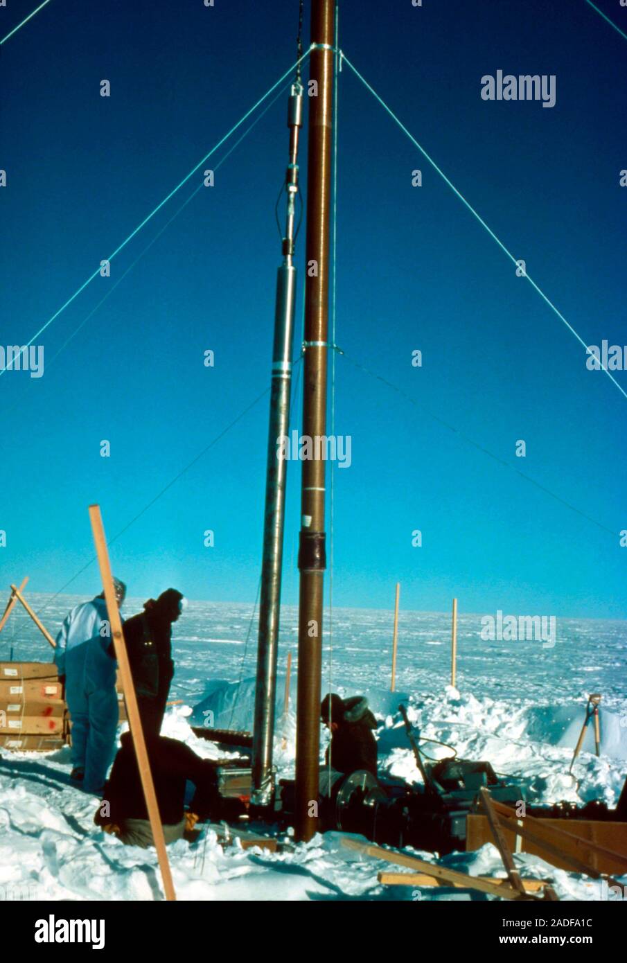 British Antarctic Survey (BAS) glaciologists use an electromechanical ...